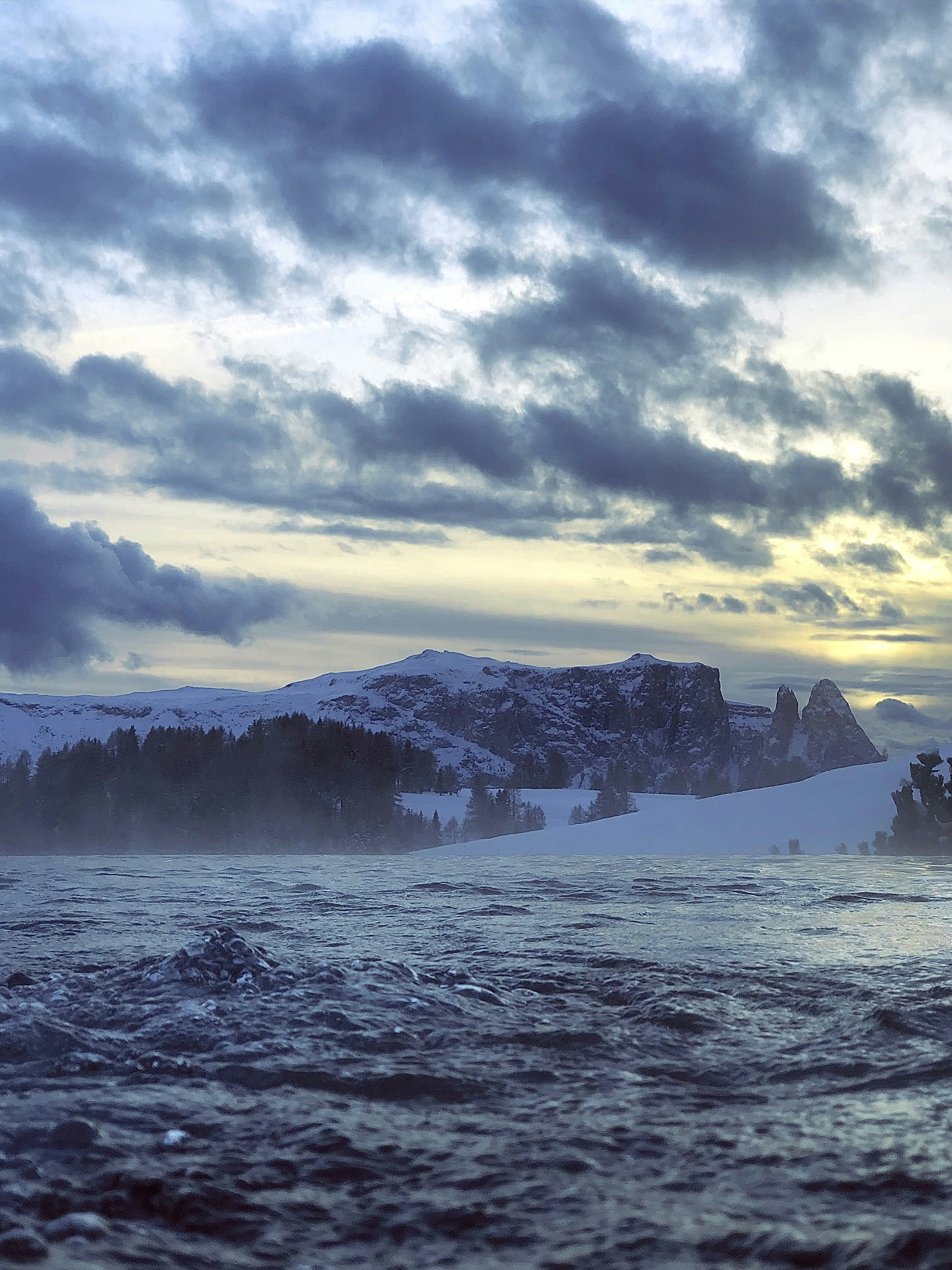 Dawn Mist Over a Snowbound Ridge