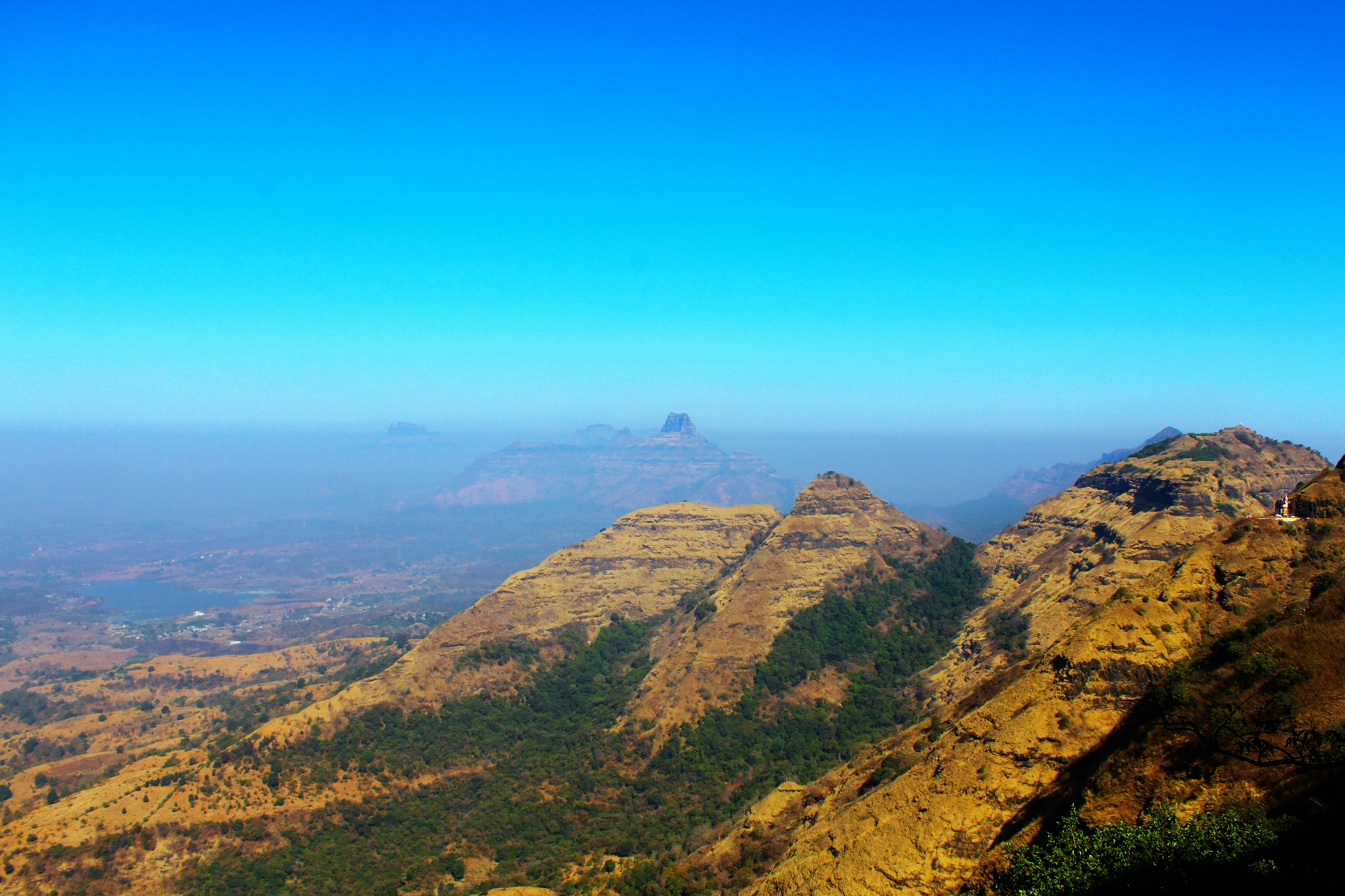 Golden Peaks Against Azure Skies