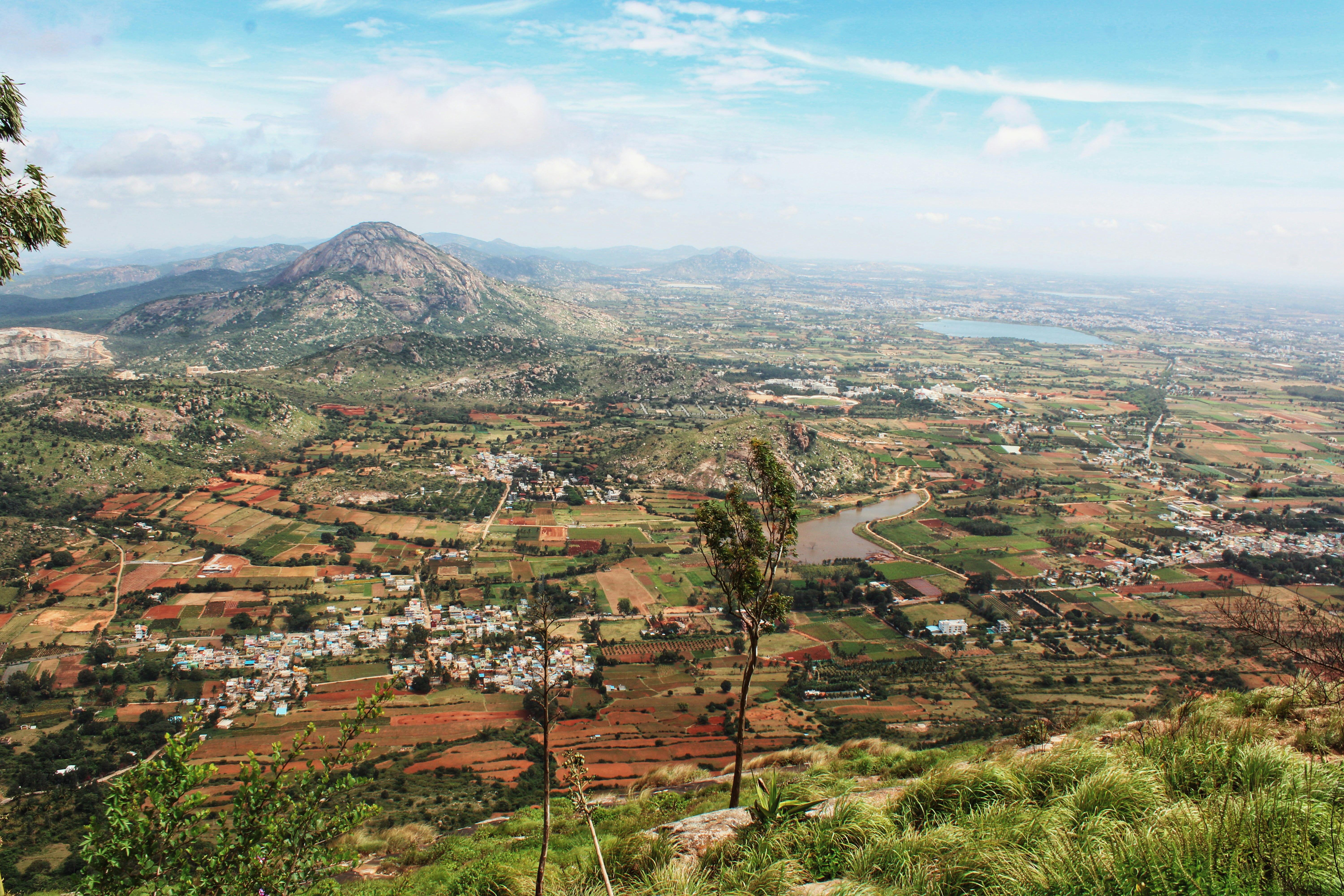 A scenic view of a city and a river photo – Free Nandi hills Image on ...