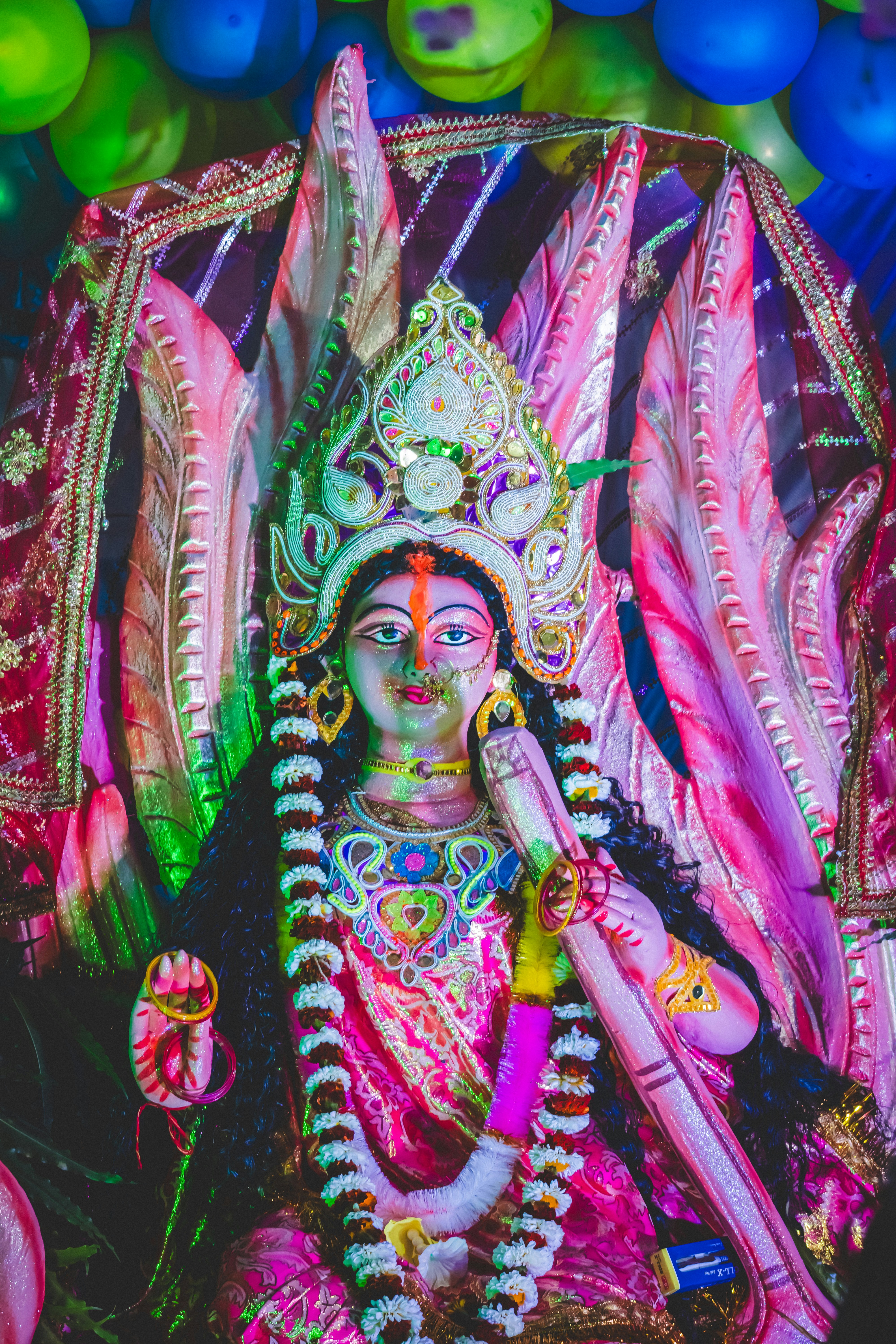 A statue of a woman in a colorful costume photo – Free Medininagar ...