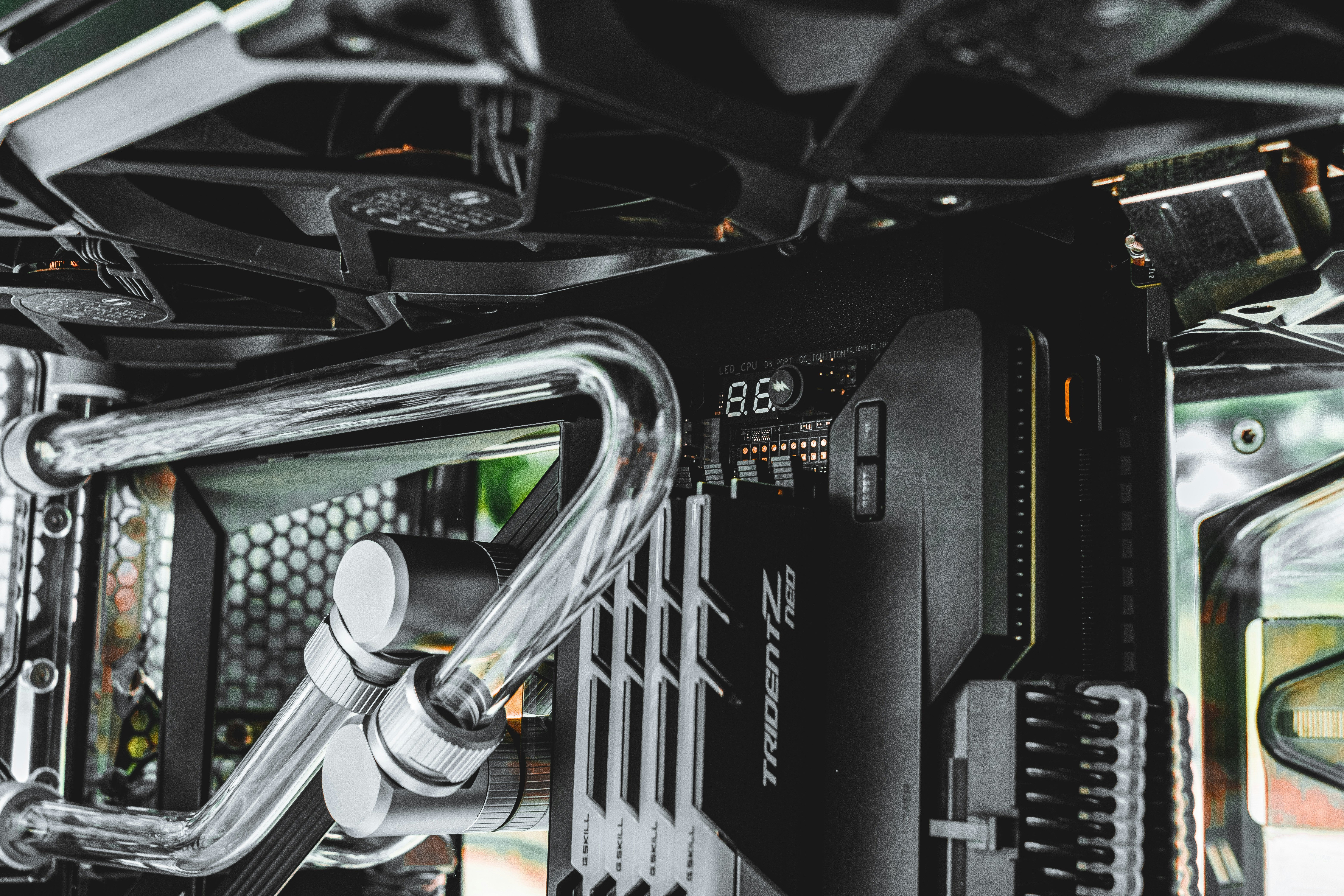 A close up of a computer case with metal pipes photo – Free Computer ...