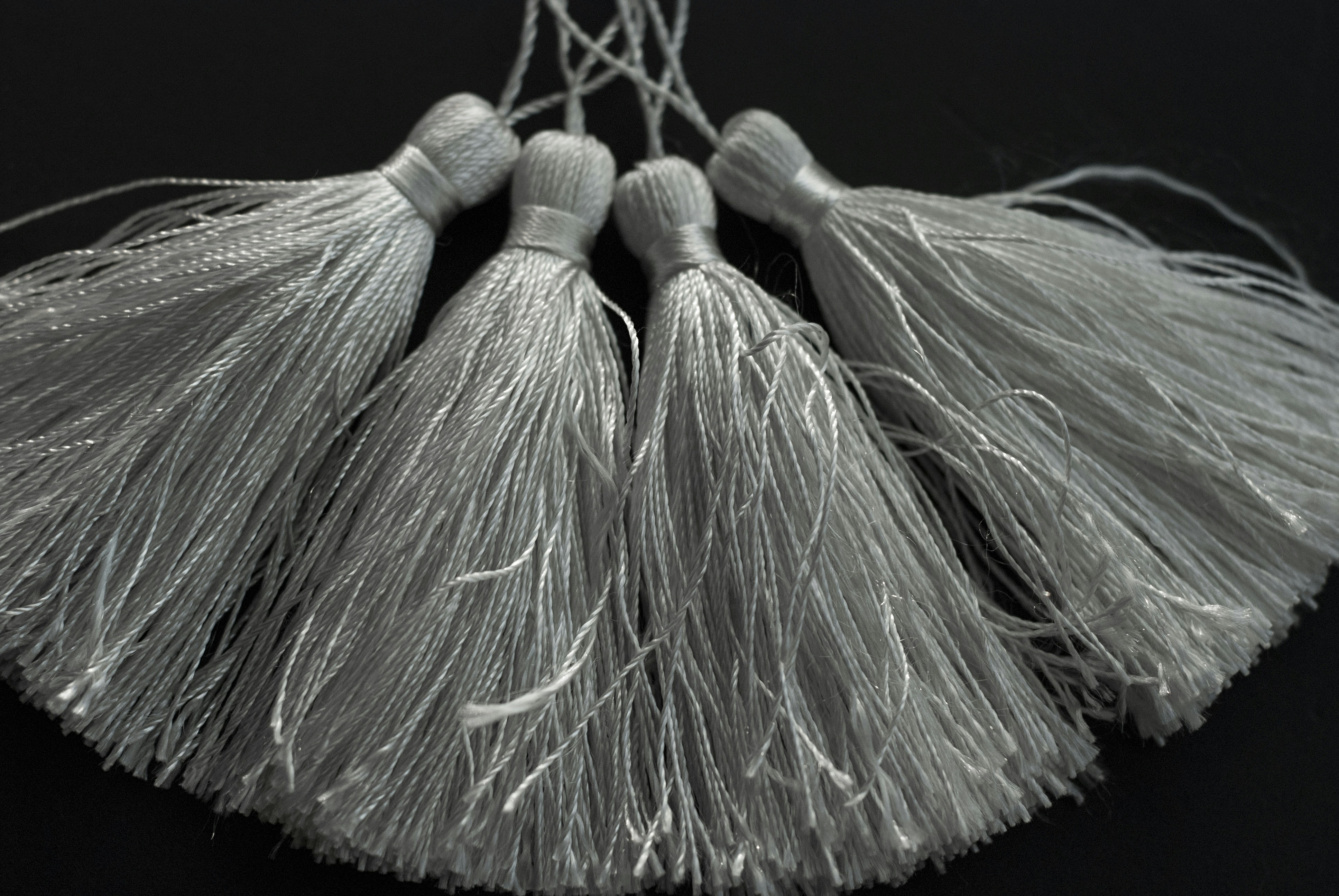 A group of tassels hanging from a string photo – Free Люблинская улица ...