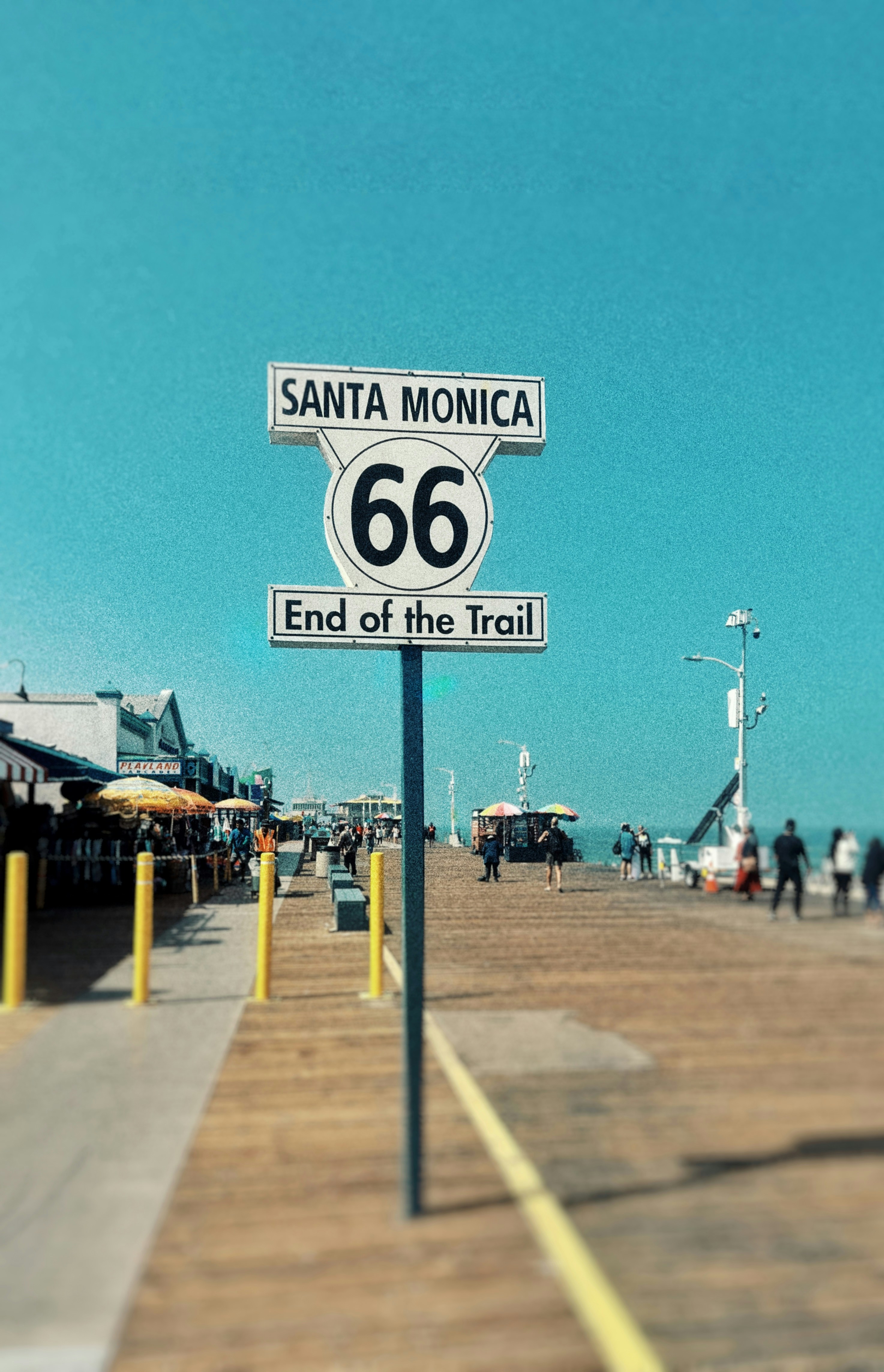 End of the Trail Sign on Santa Monica Pier: Route 66 Beneath a Turquoise Sky