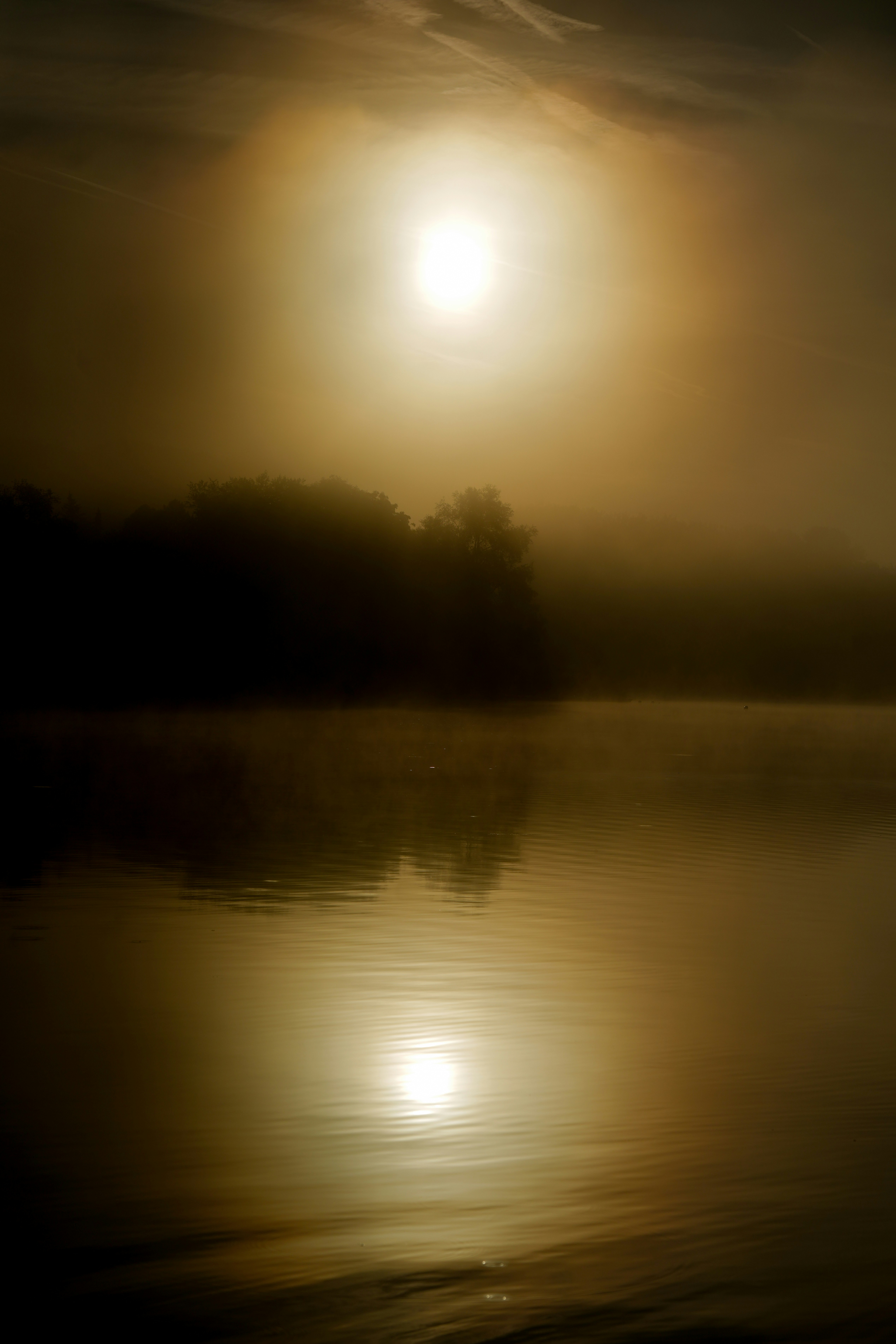 Ethereal Dawn Over Misty Waters