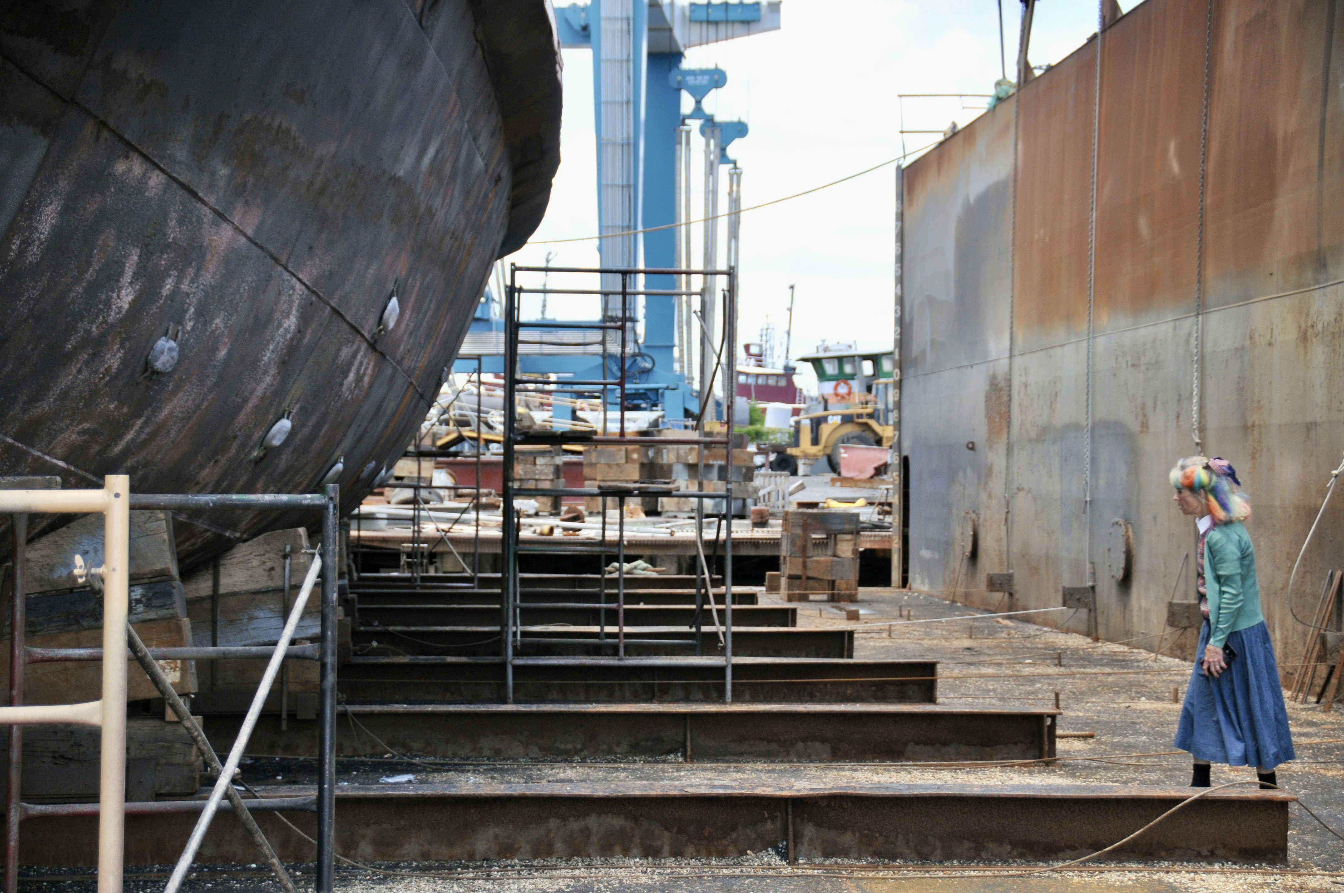 Blue Skirt at the Edge of a Giant Hull