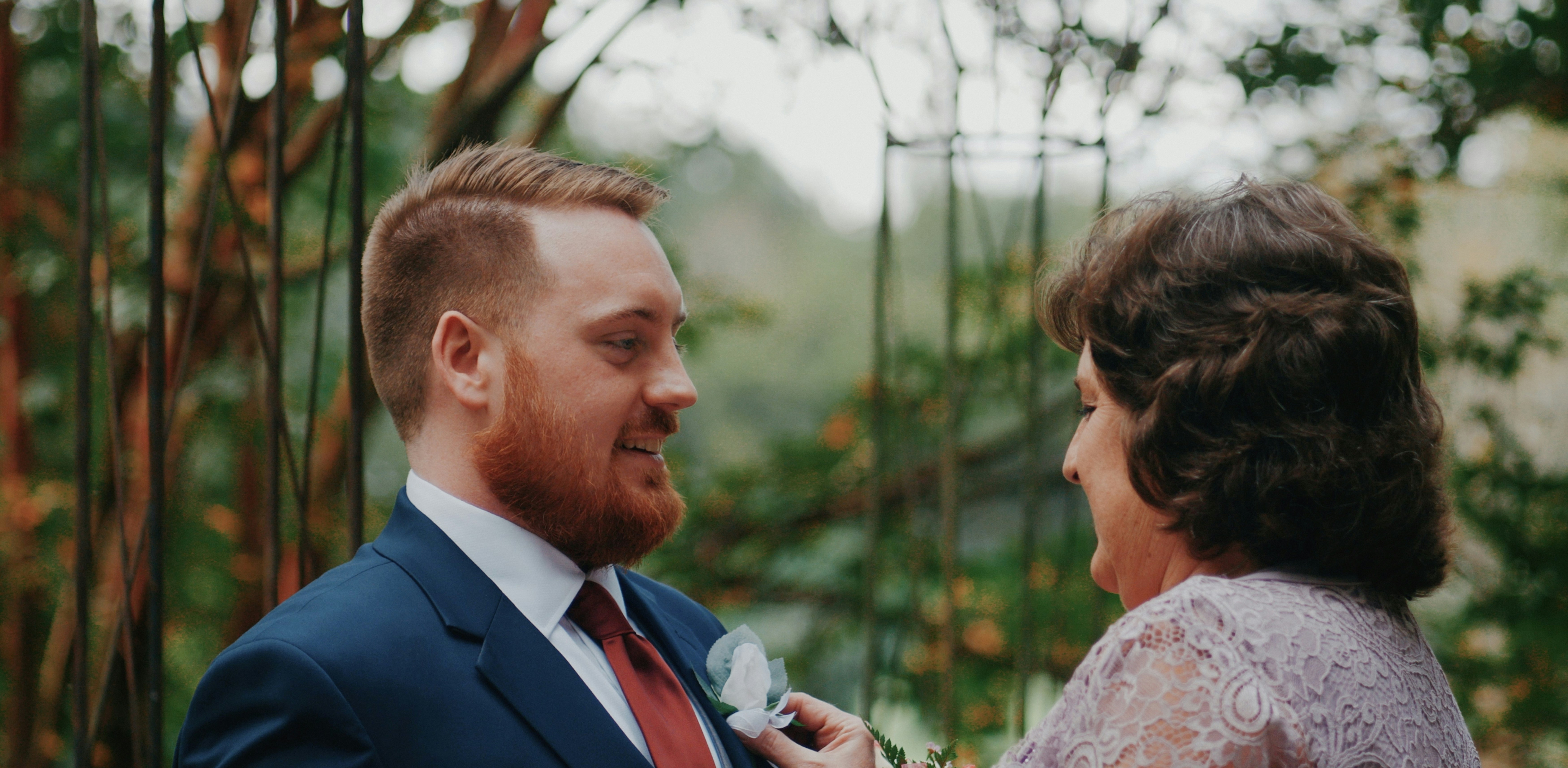 A man in a suit and tie standing next to a woman photo – Free Woman ...
