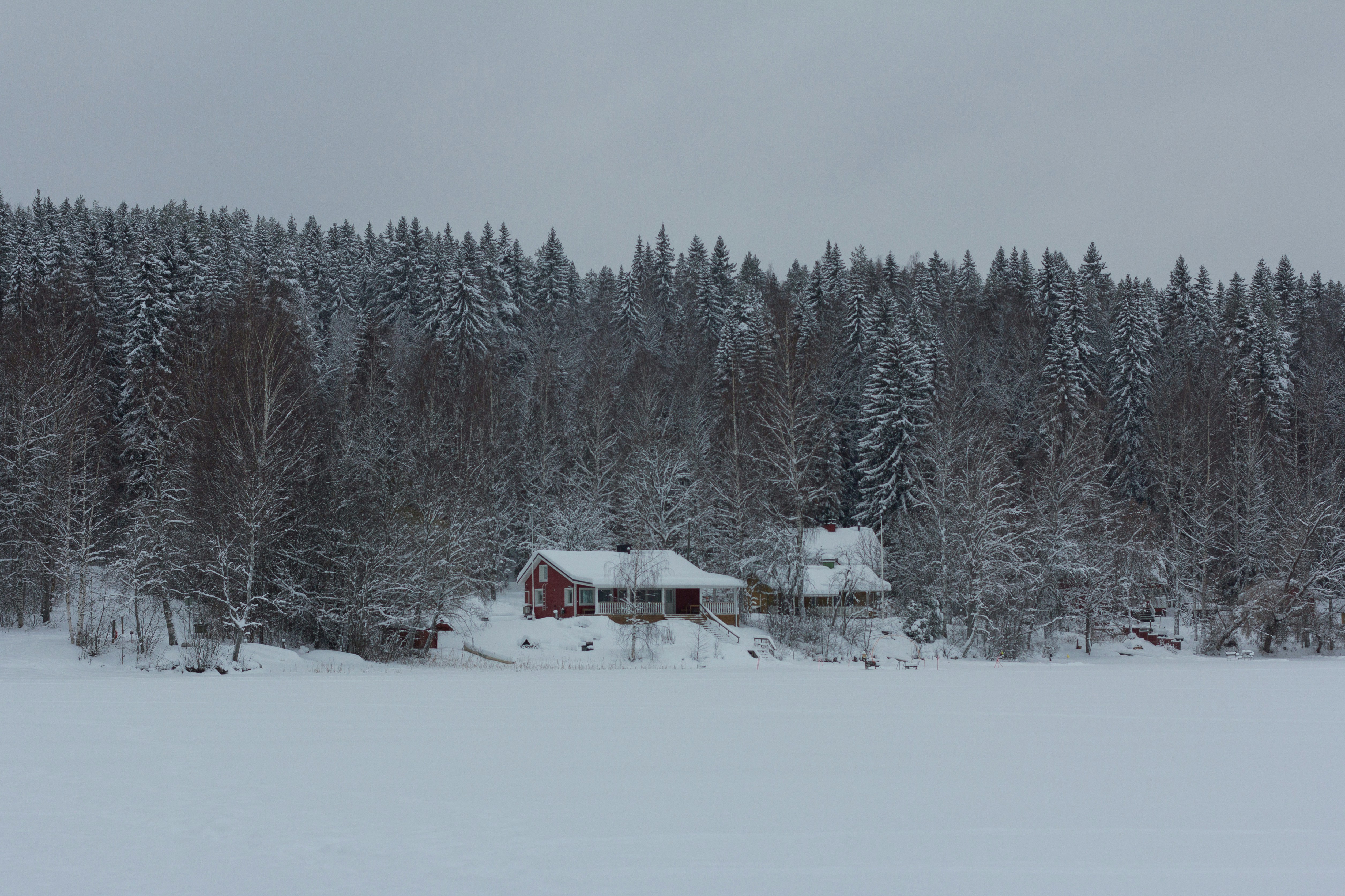 Finnish house by the frozen lake