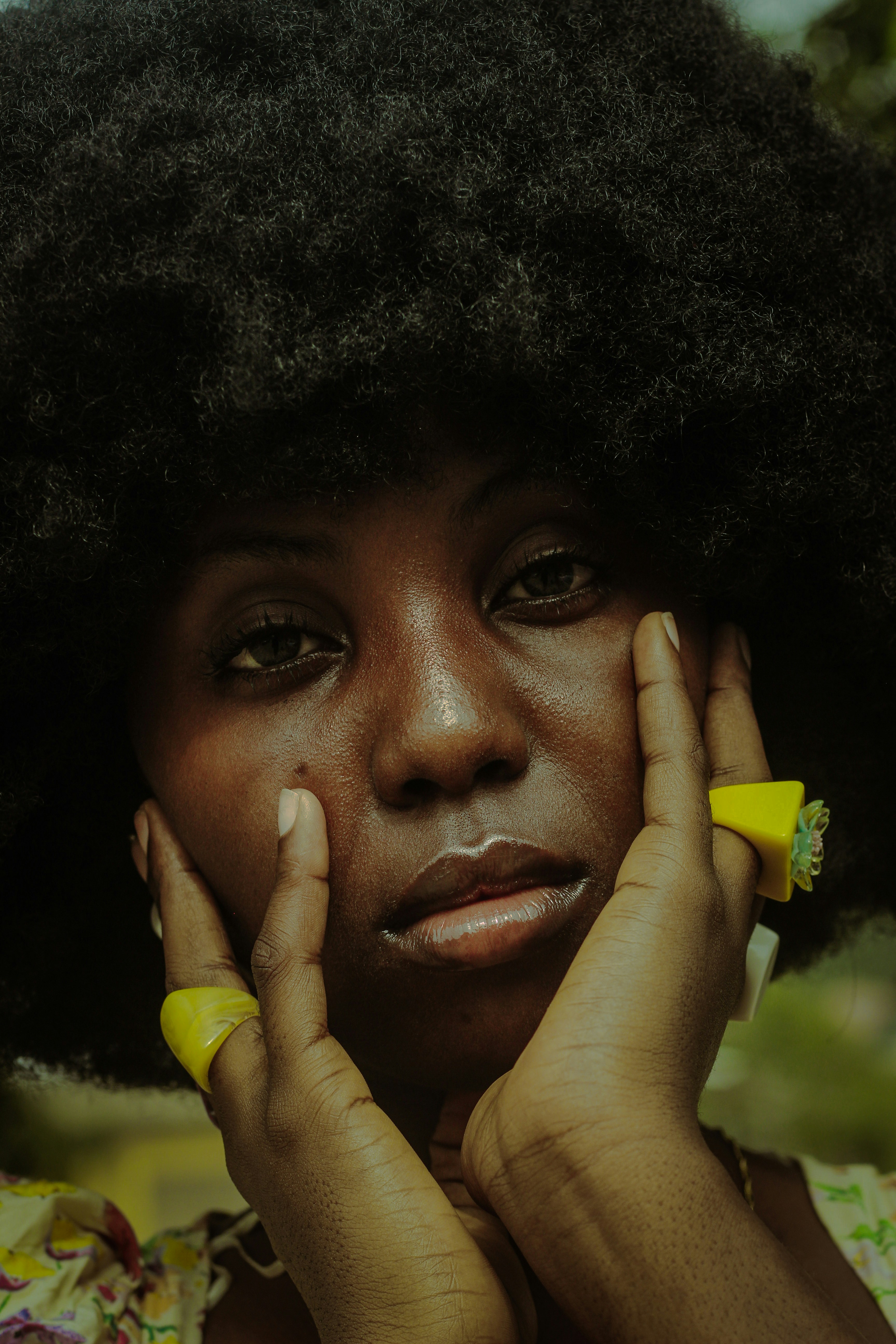 A close up of a person with an afro photo – Free Portrait Image on Unsplash