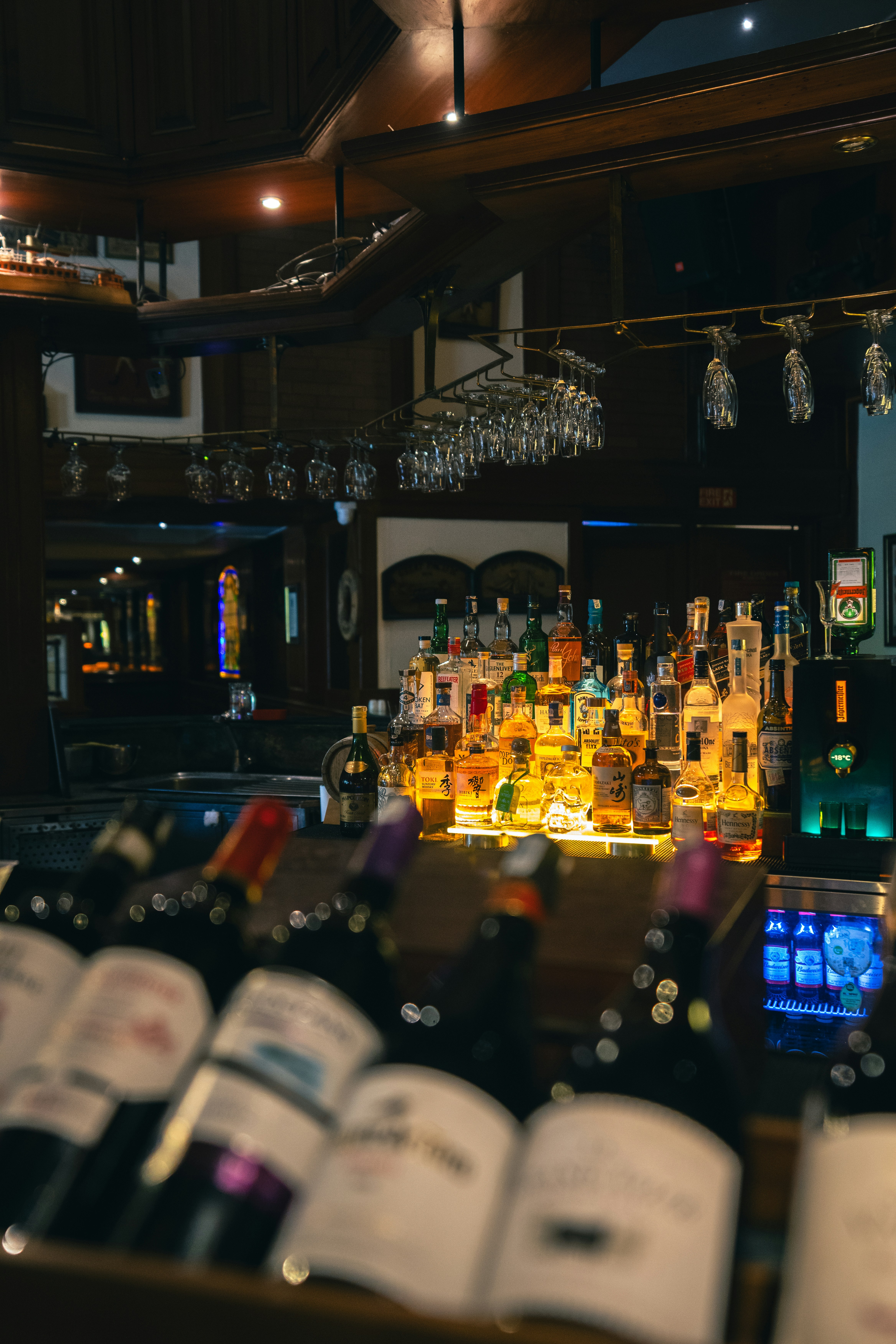 A bar with bottles of alcohol on it photo – Free Bar Image on Unsplash