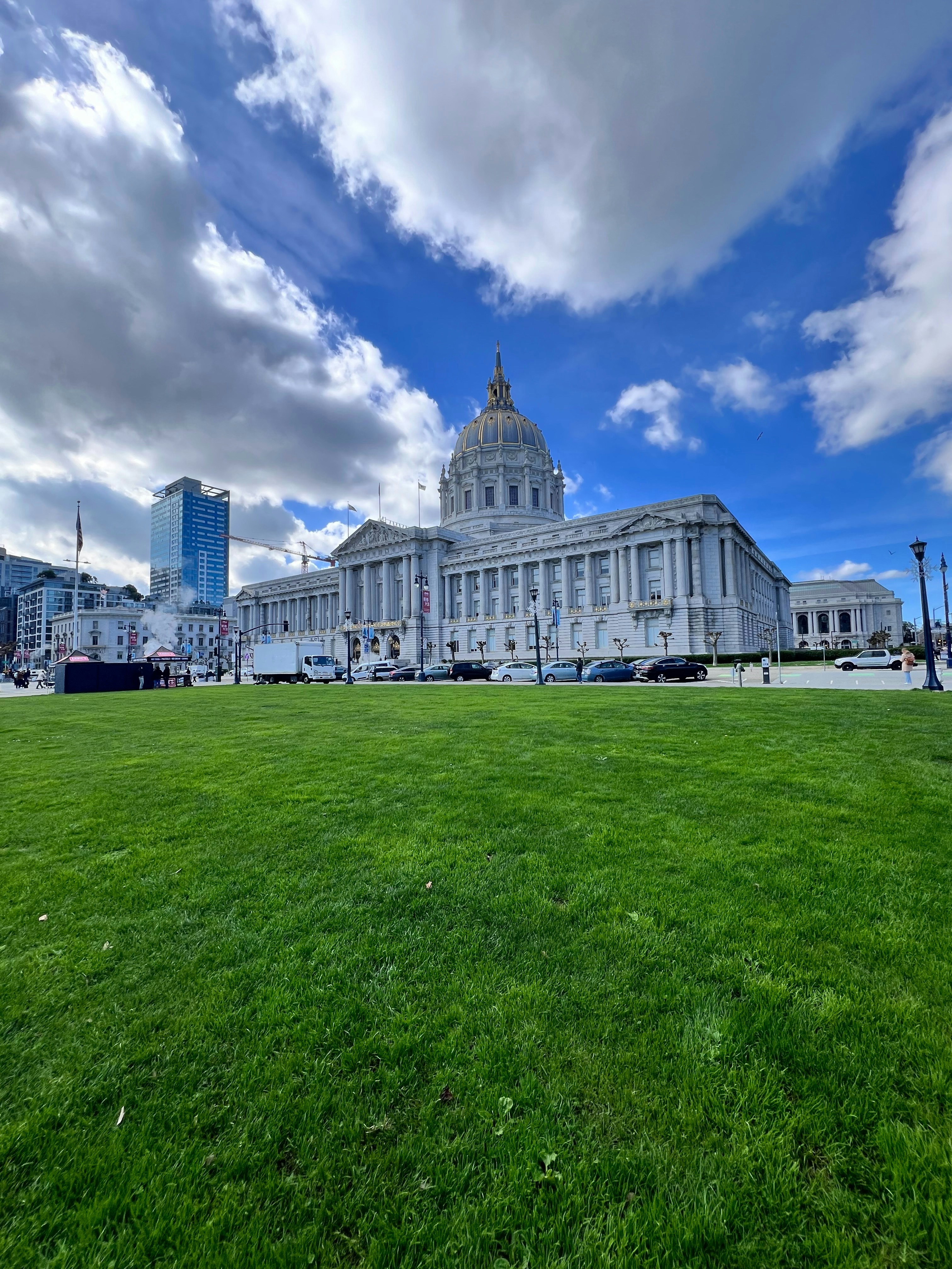 Capitol Dome Framed by Cloudscape and a Lush Lawn