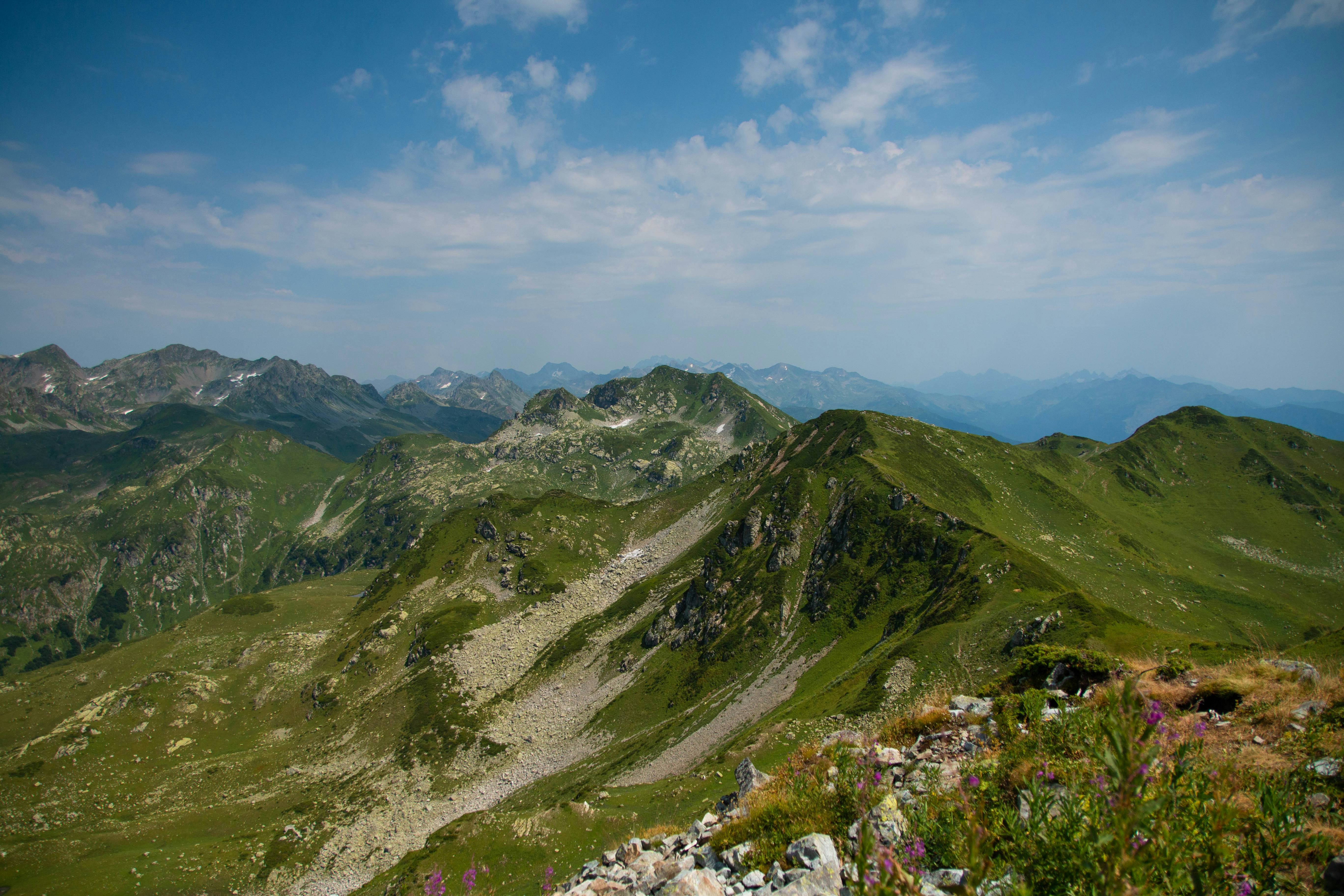 A view of a mountain range from a high point of view photo – Free ...