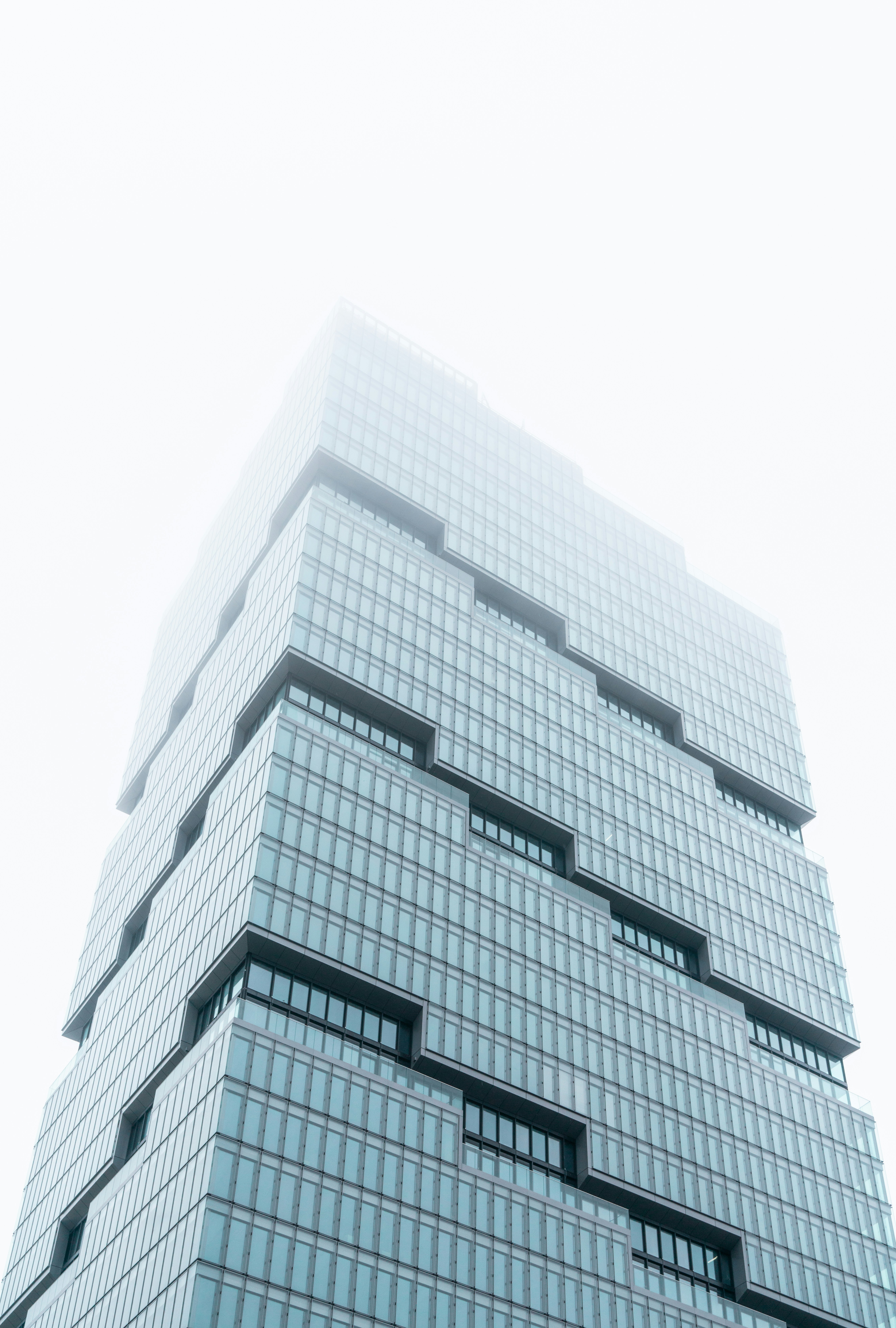 A very tall building with lots of windows photo – Free Architecture ...