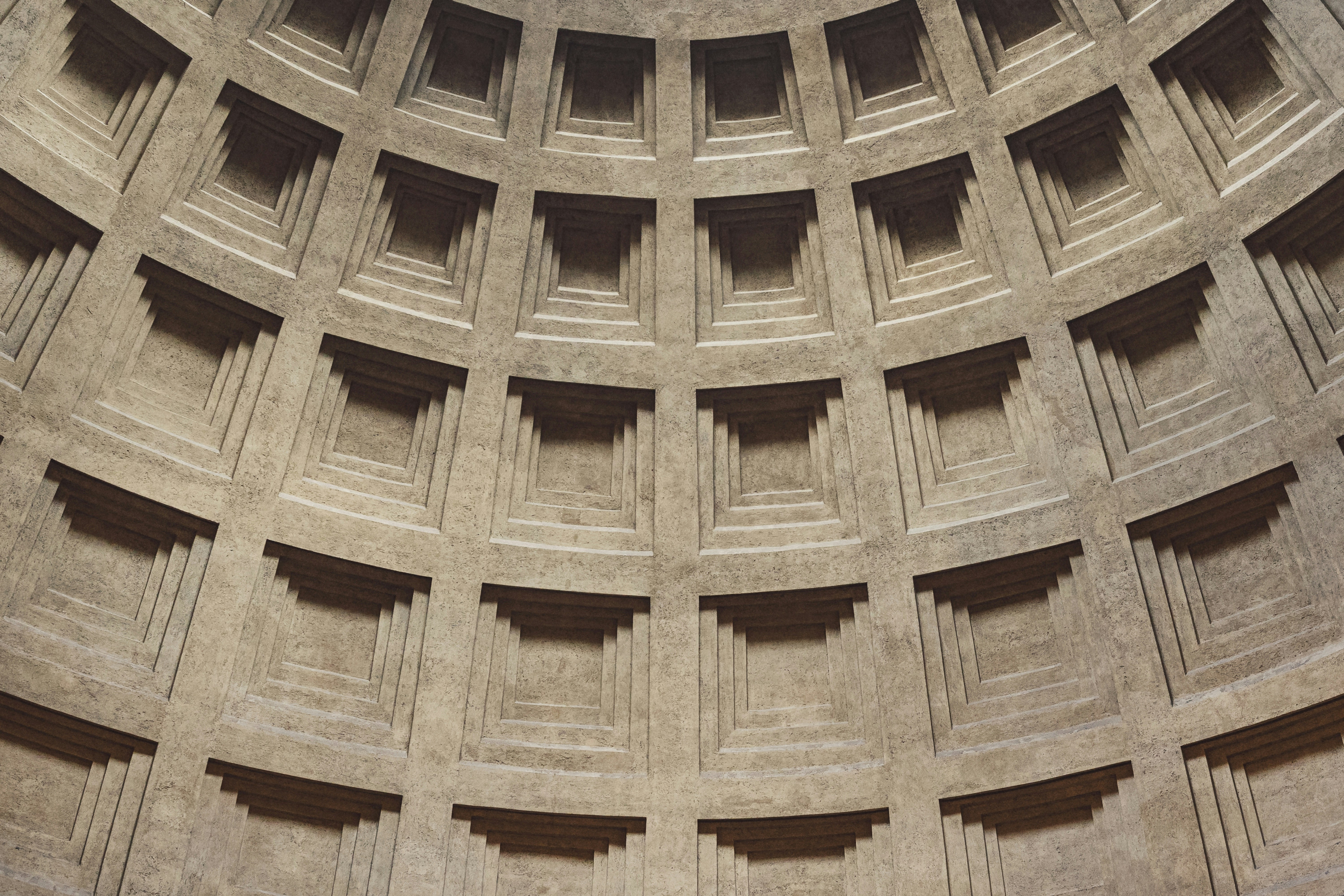Part of the roof of the impressive Pantheon, Rome | a clock on the side of a building