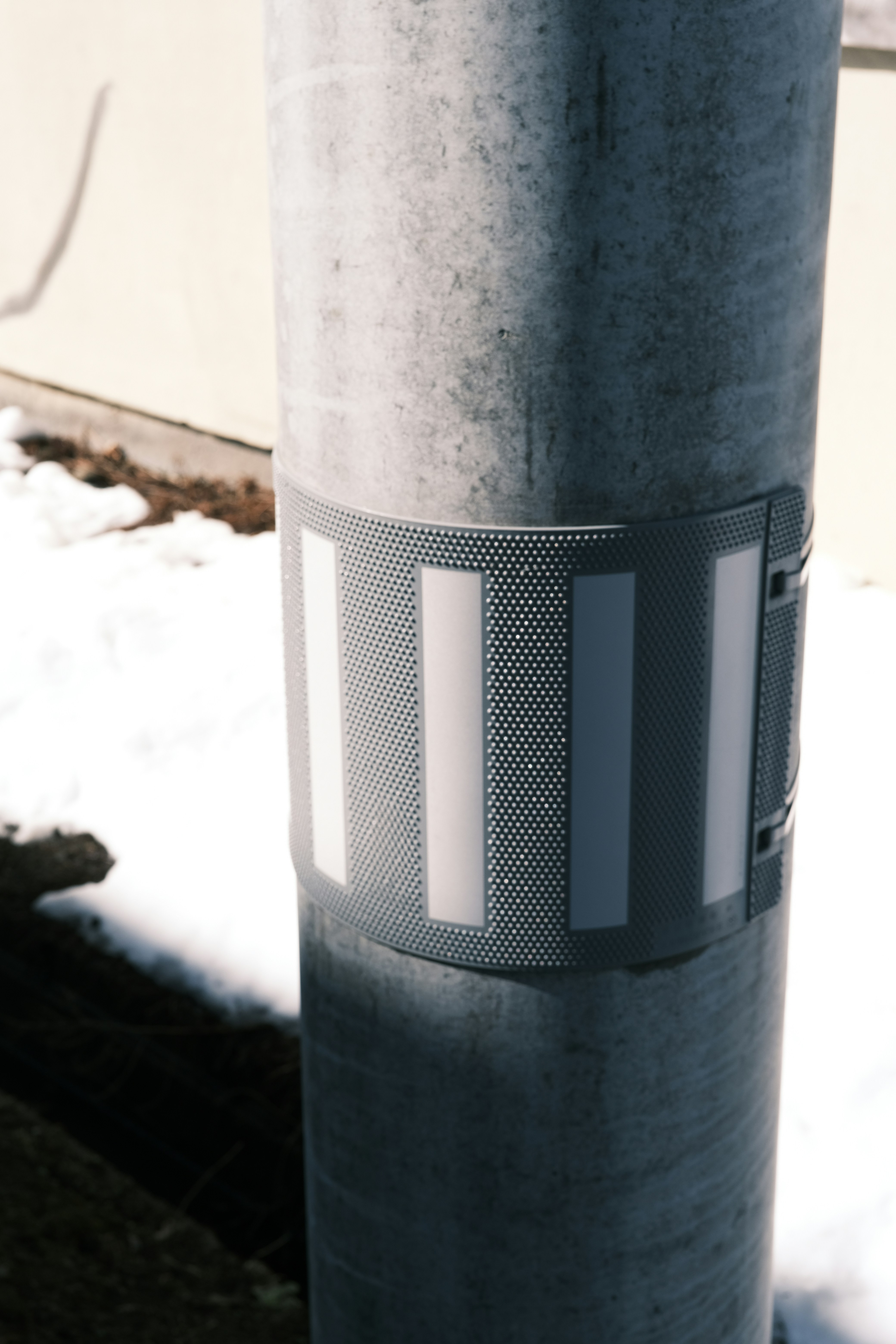 Industrial Beacon: Snow, Steel, and a Striped Band
