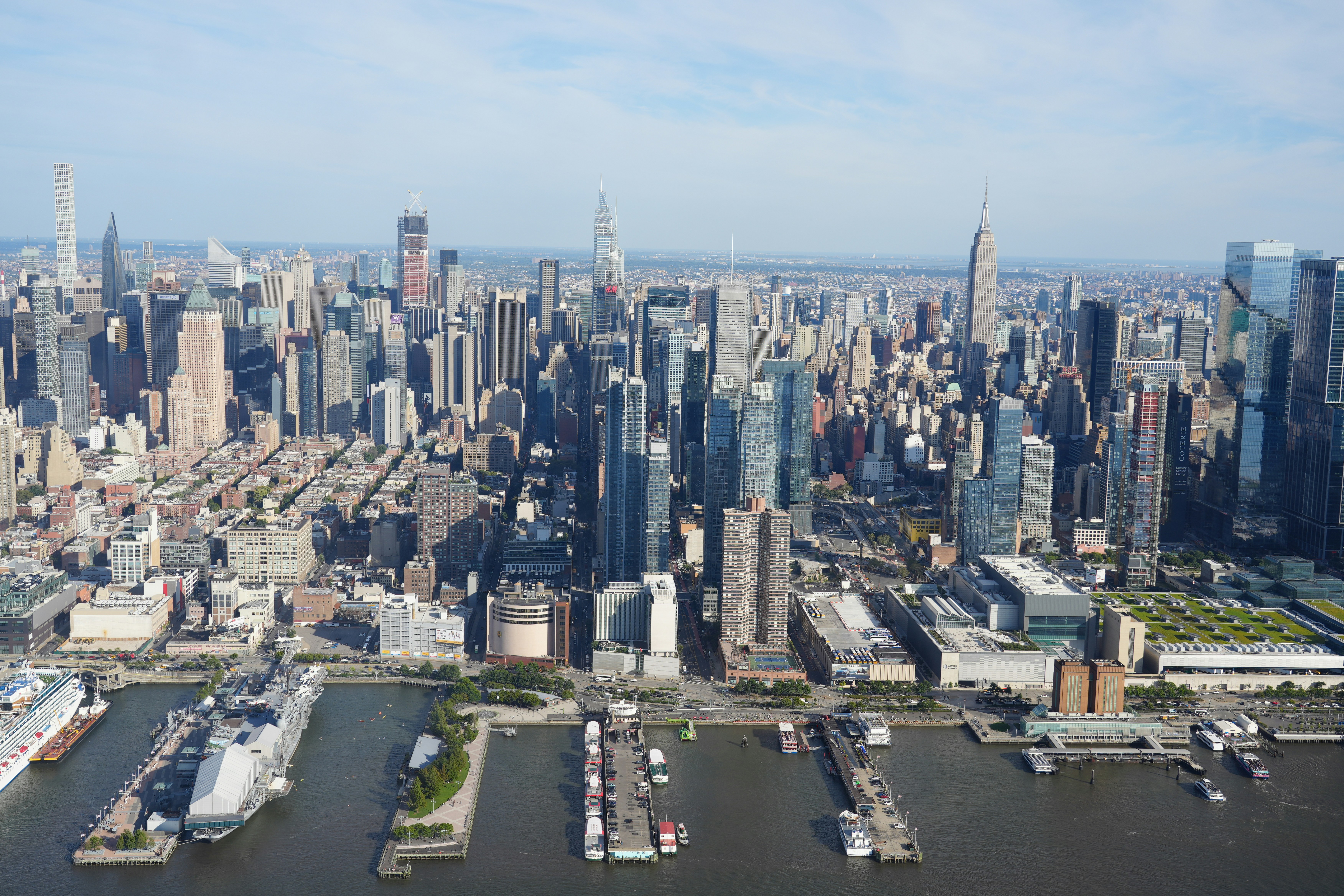 An aerial view of a large city with tall buildings photo – Free Grey ...