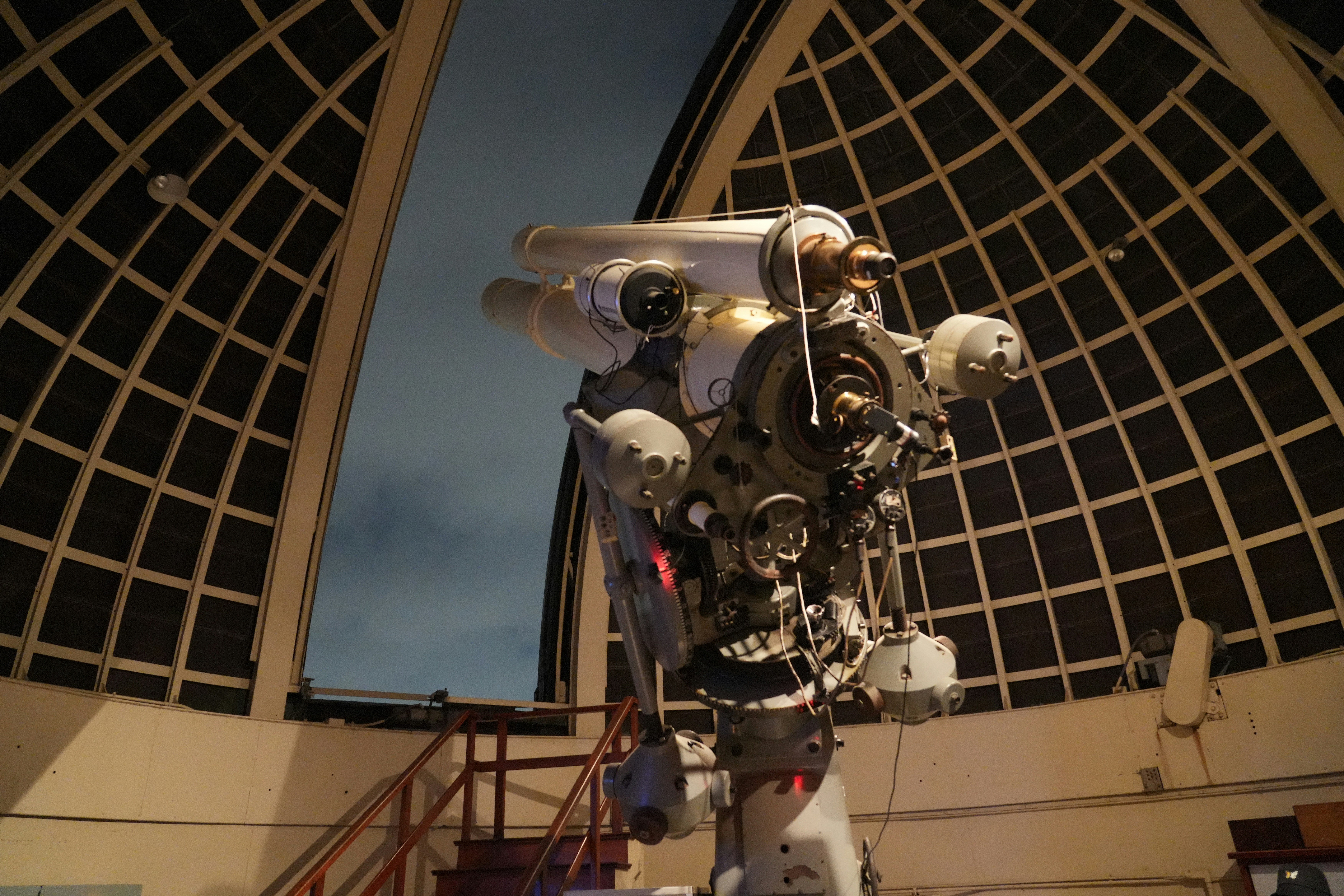 A large metal object sitting inside of a building photo – Free ...