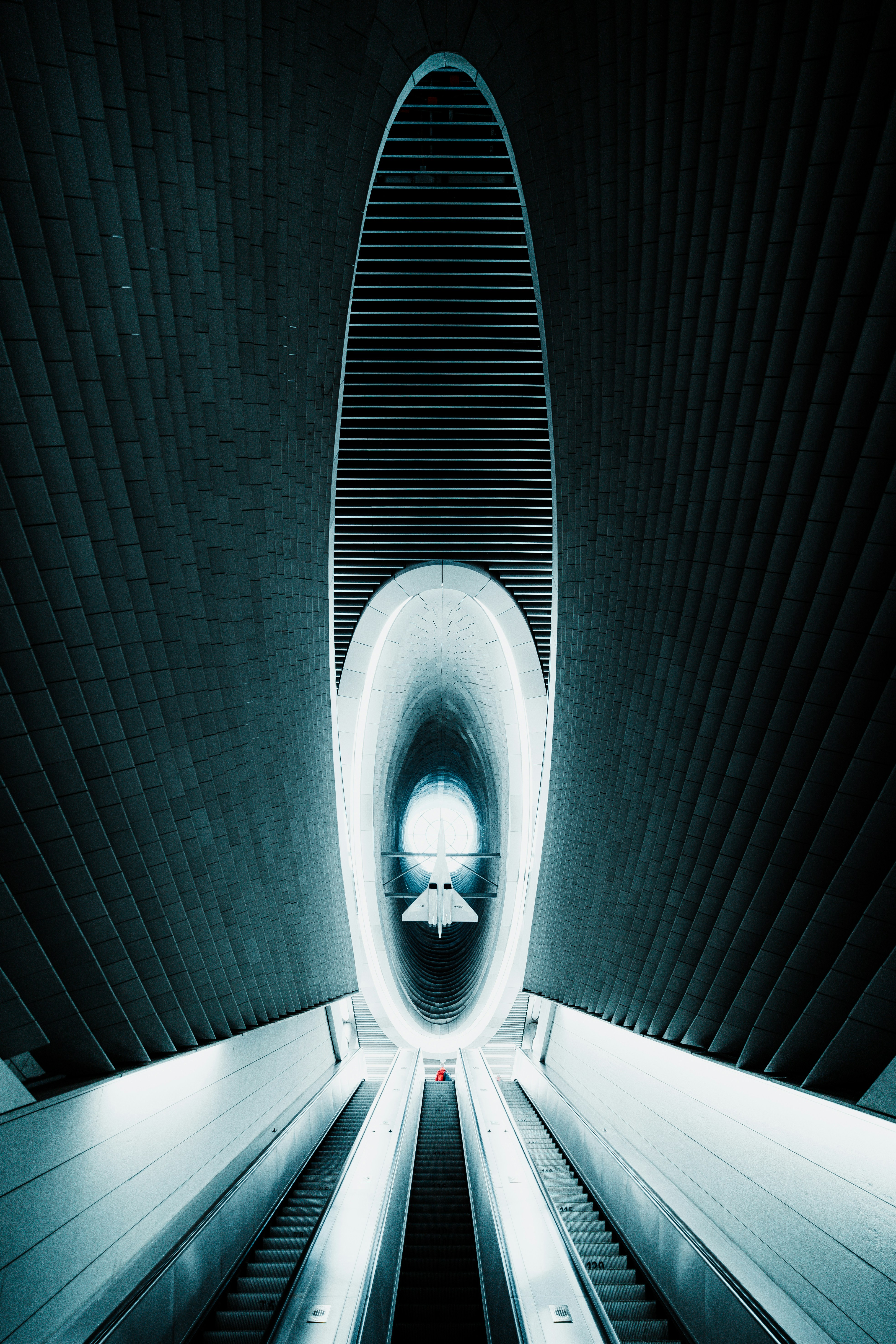 Neon Oval Atrium: Symmetry at the End of the Escalator