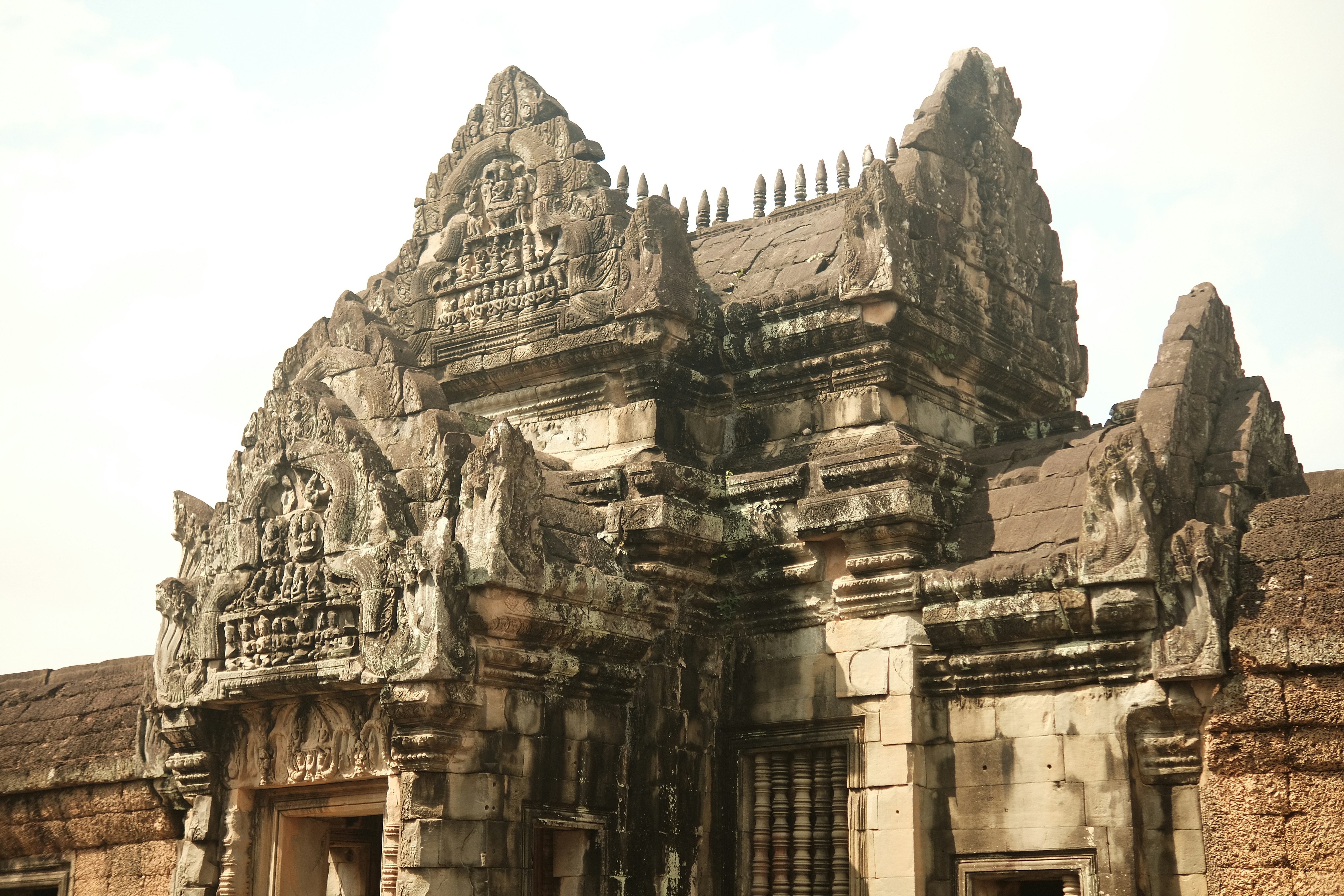 A very old building with a lot of carvings on it photo – Free Banteay ...