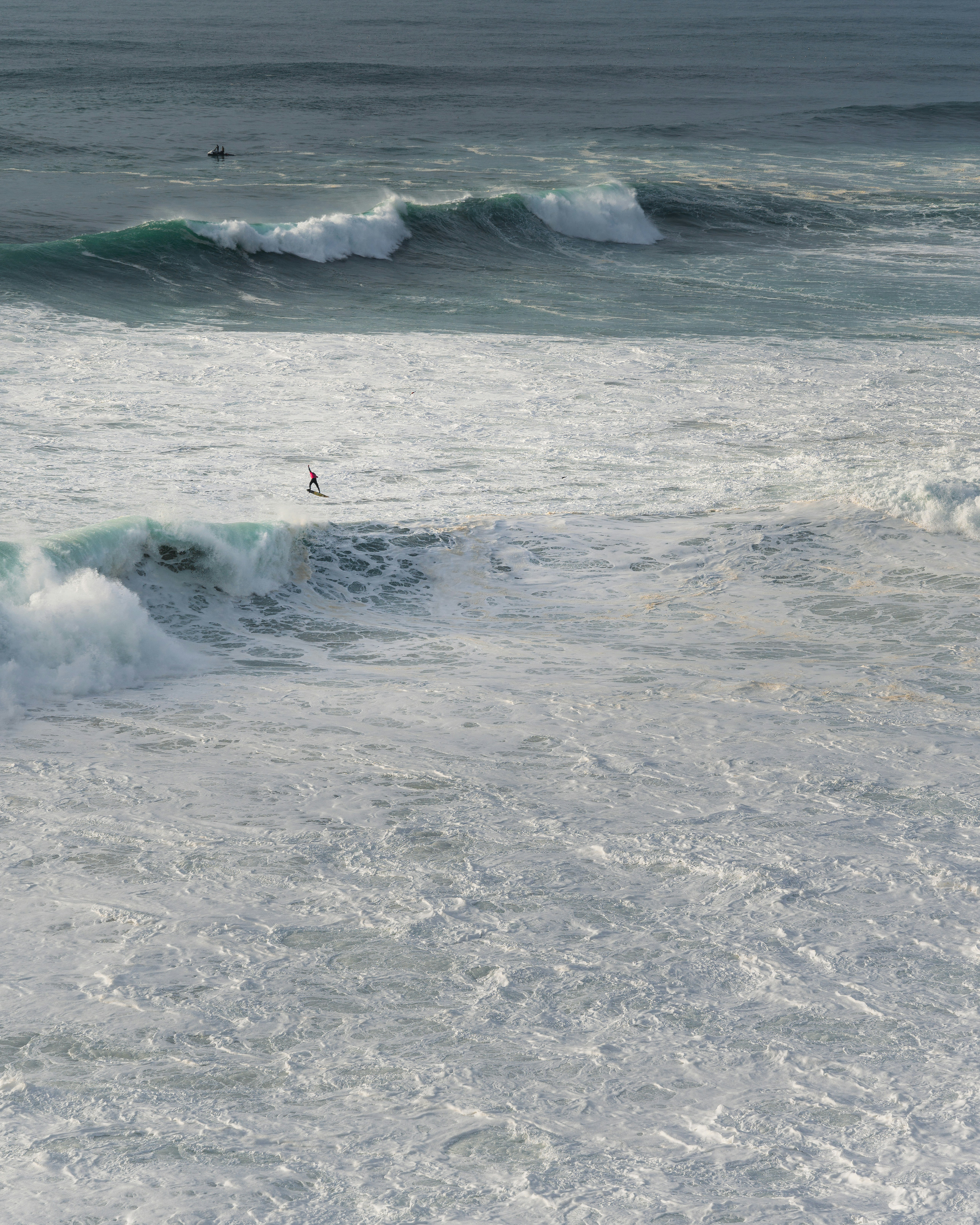 A person riding a wave on top of a surfboard photo – Free Grey Image on ...