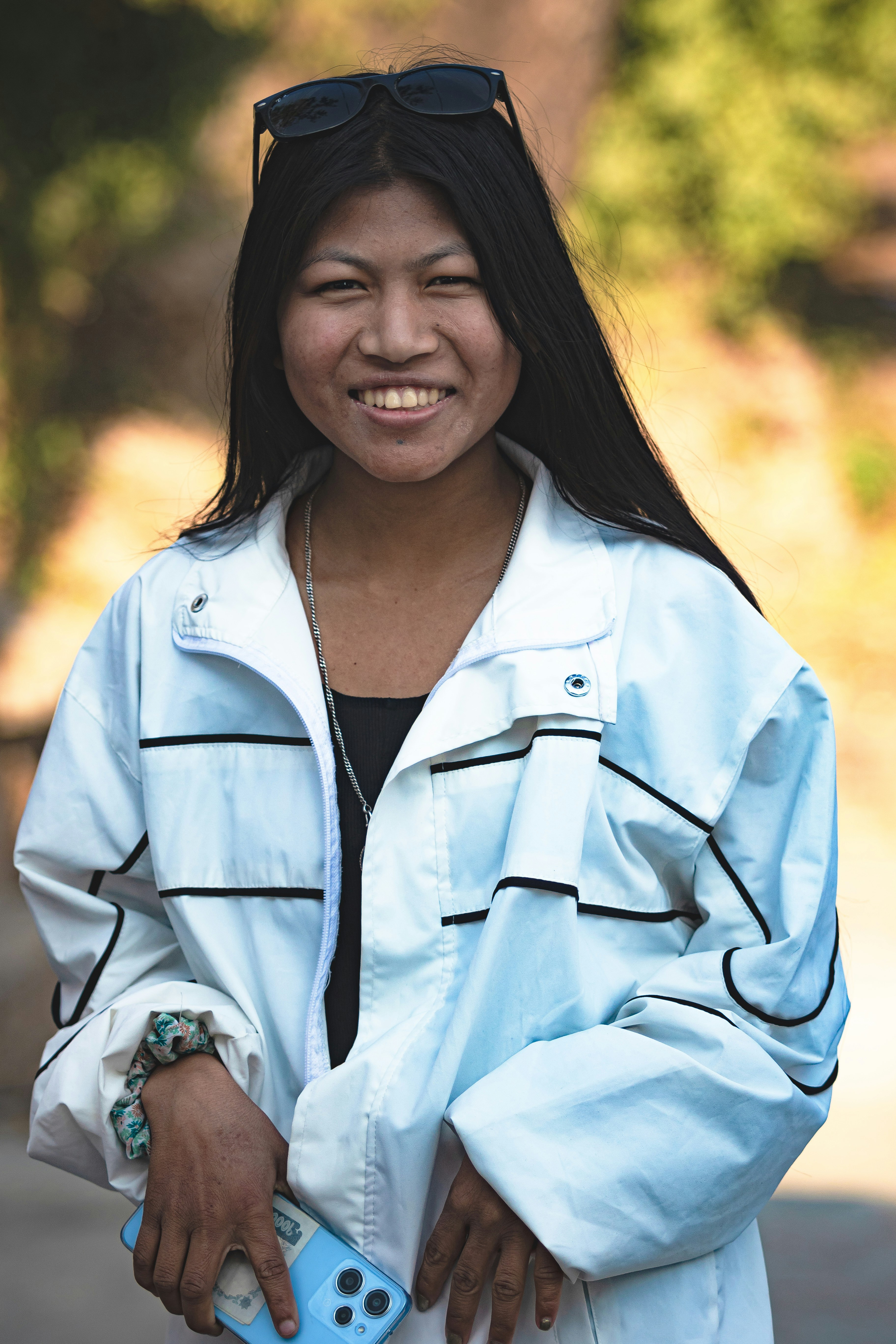 Portrait in Warm Backlight: A Casual Street-Style Moment