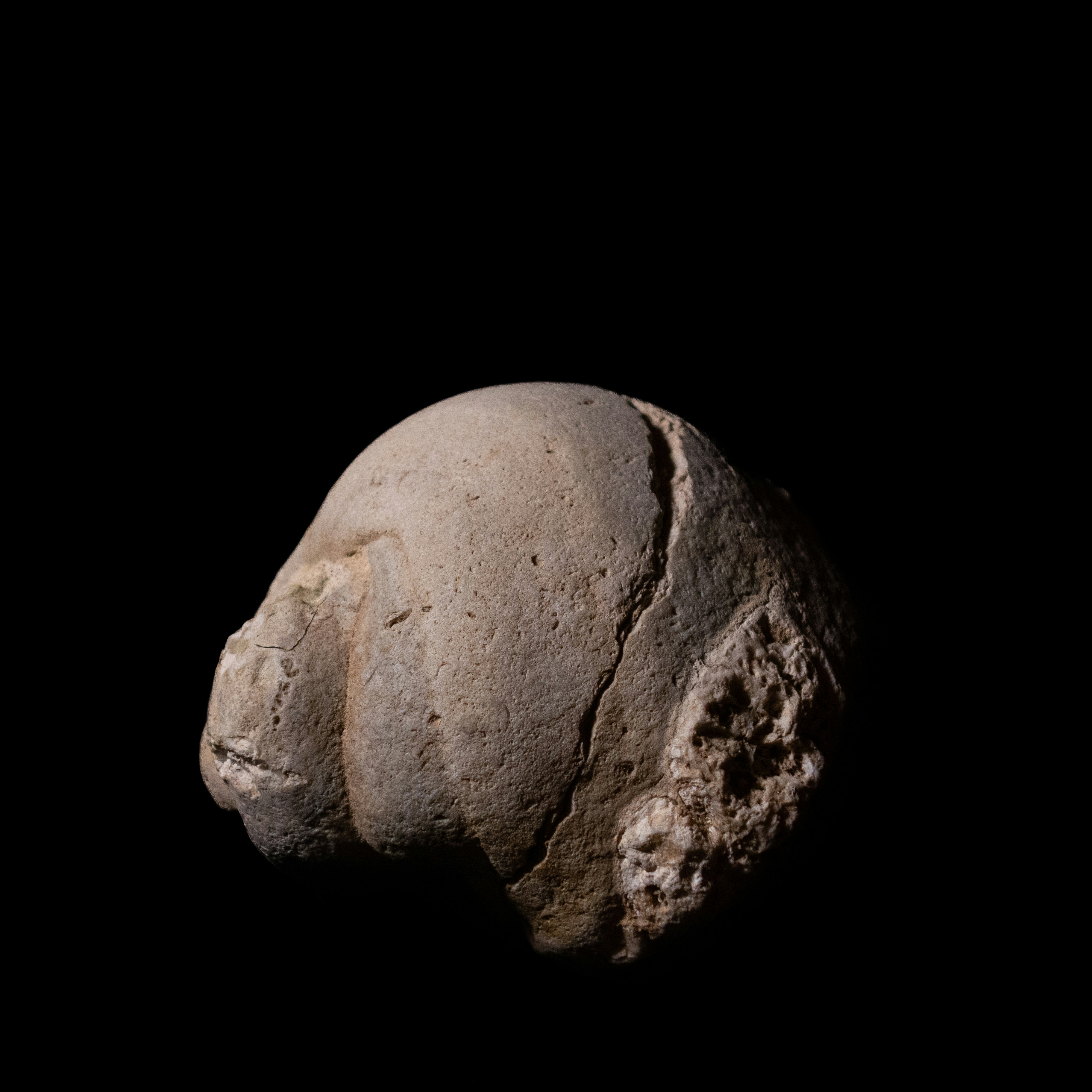 A rock is shown against a black background photo – Free Rock Image on ...