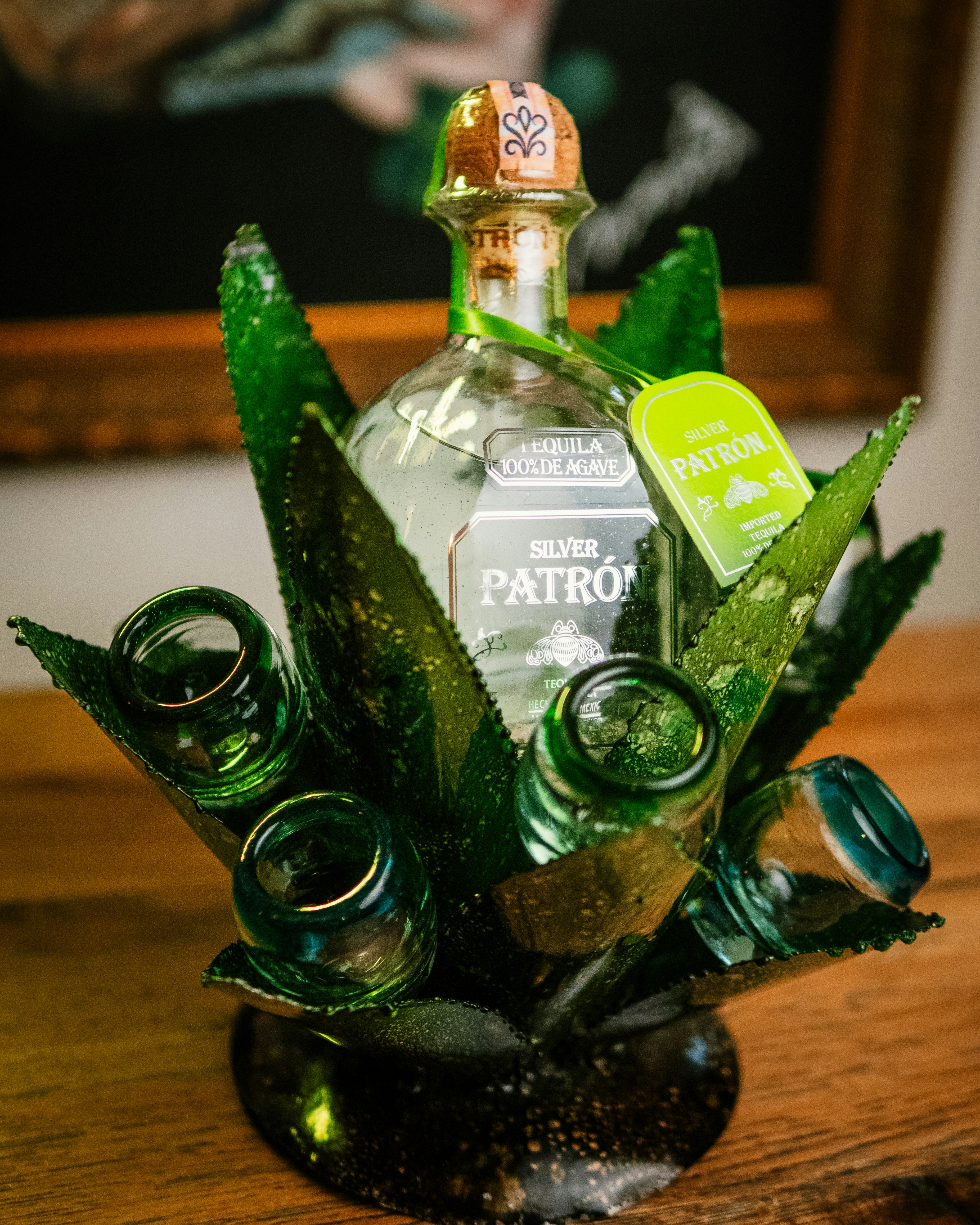 Emerald Crowned Patrón: A Green Glass Still Life