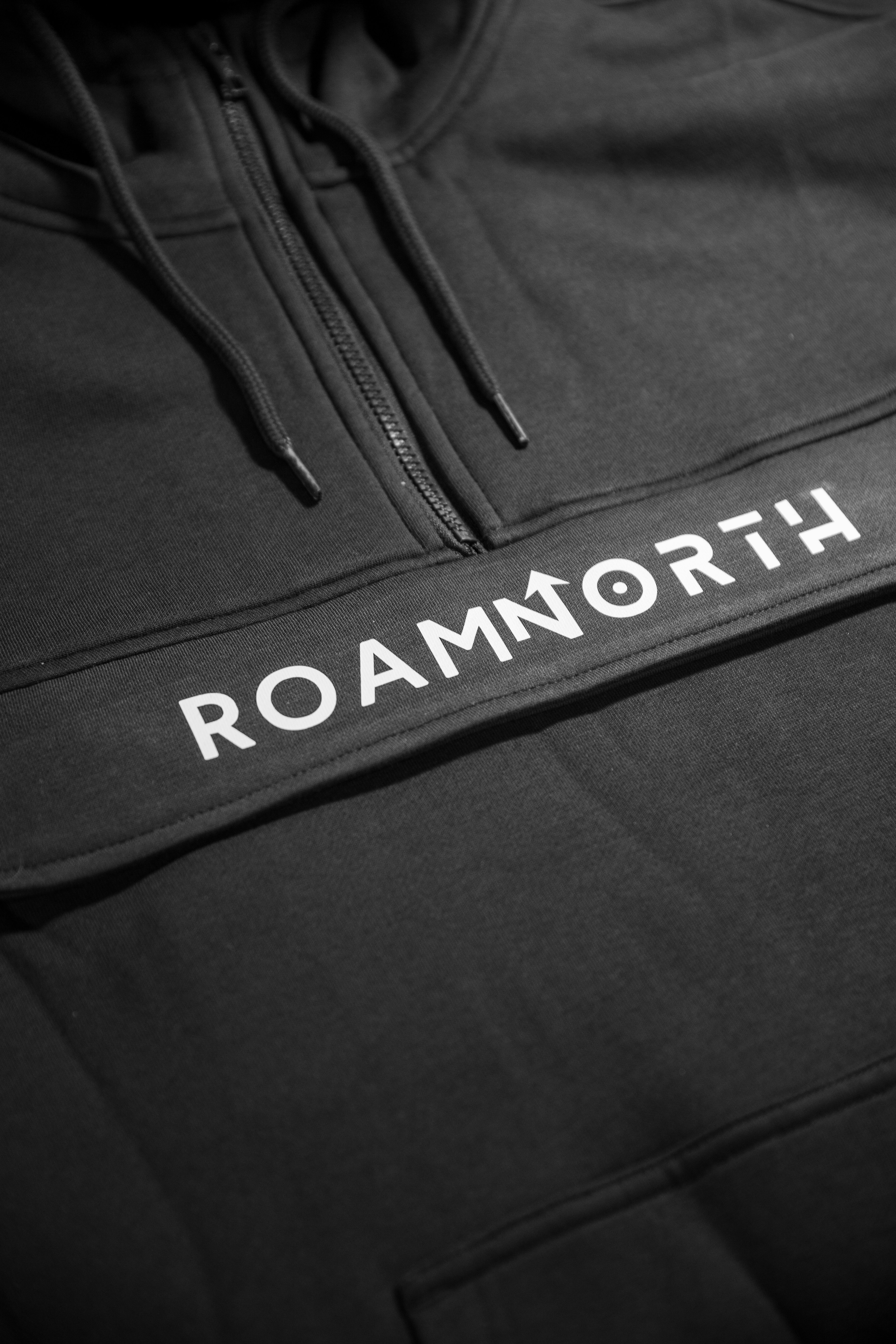 A black sweatshirt with the word roam north printed on it photo – Free ...