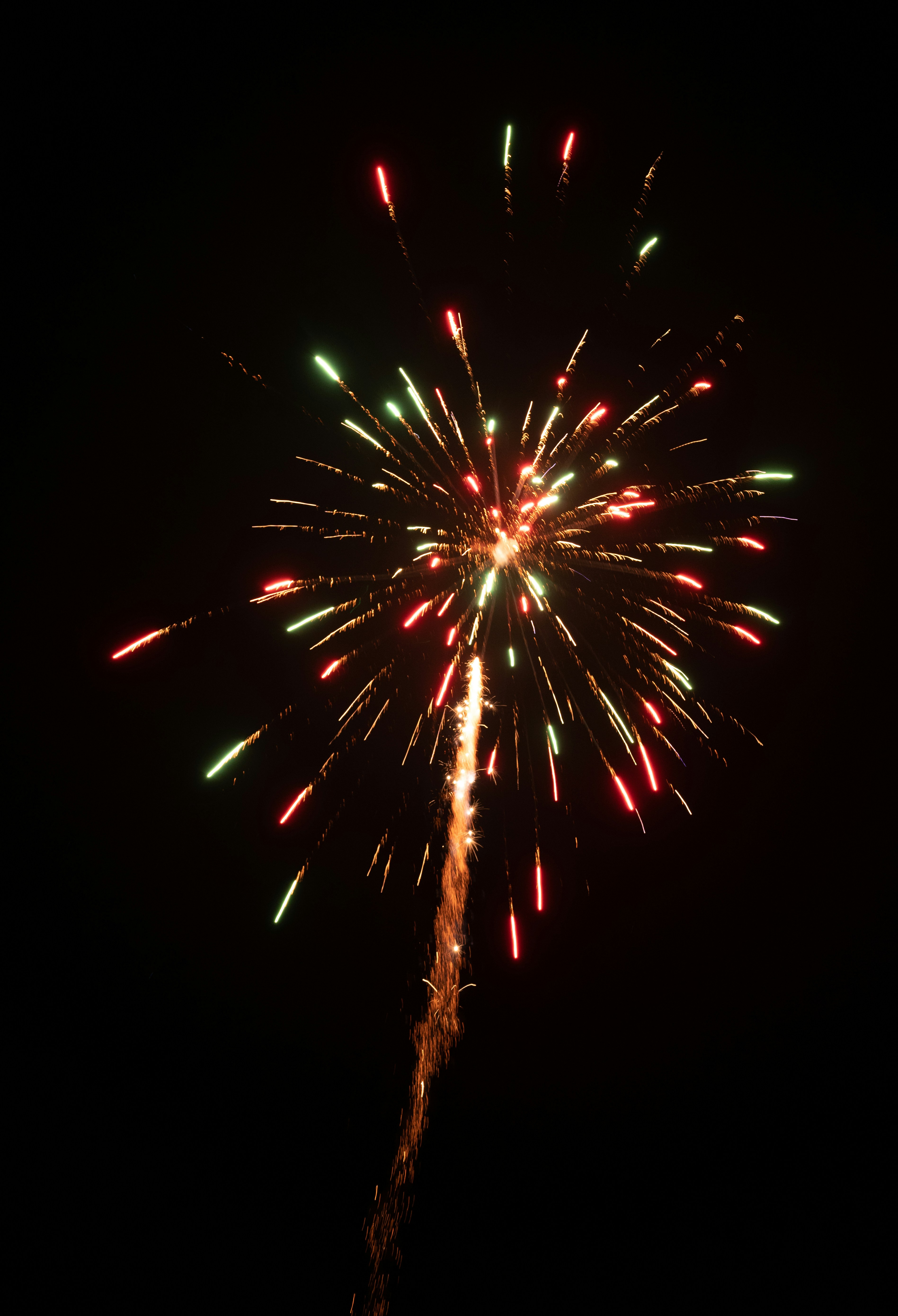 A fireworks is lit up in the night sky photo – Free Chong qing Image on ...