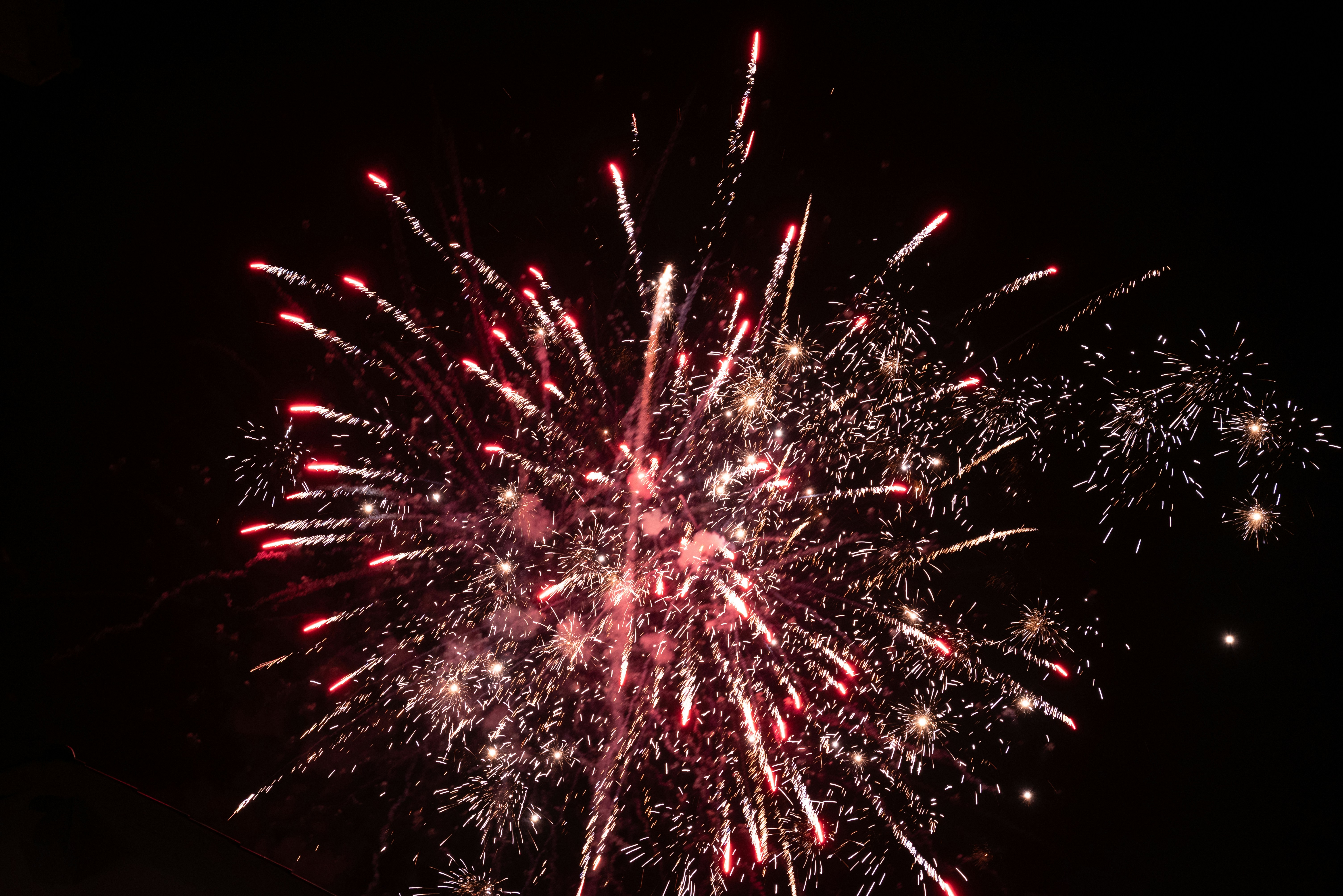 A large fireworks is lit up in the night sky photo – Free Chong qing ...