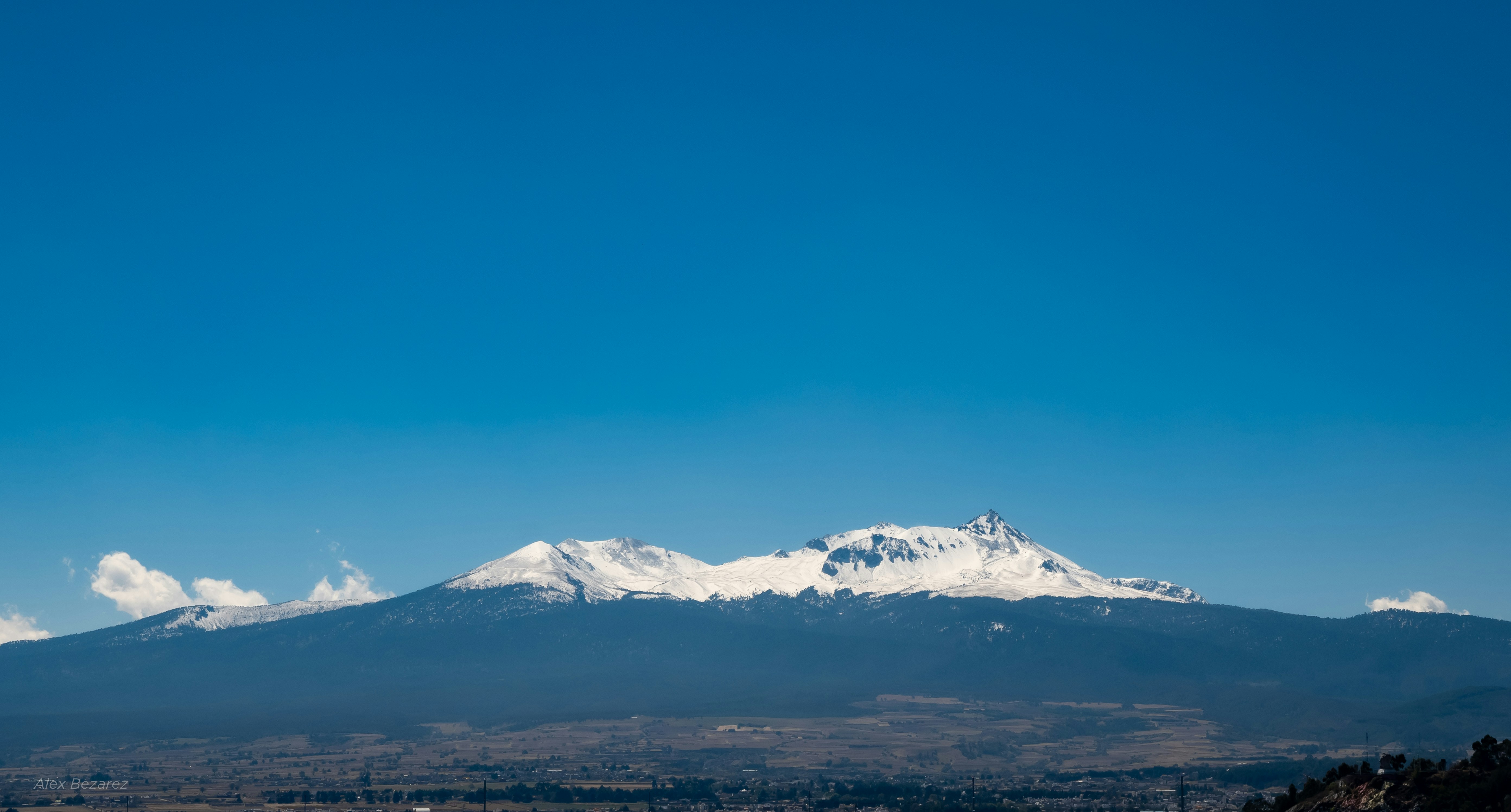 Snow-Capped Peaks under Azure Skies