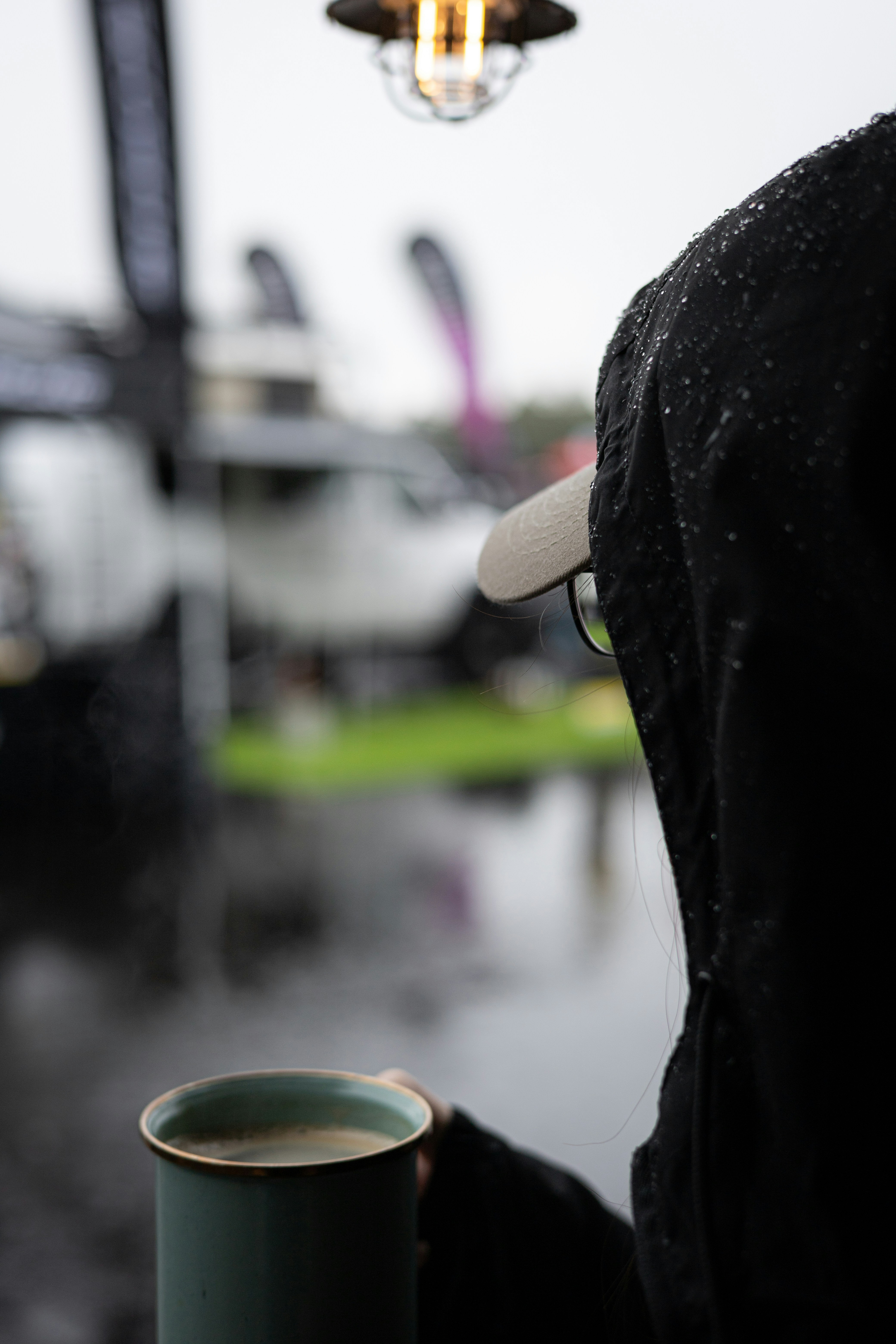 Rain-Kissed Scene: A Hidden Mug and Wet Bench in Soft Focus