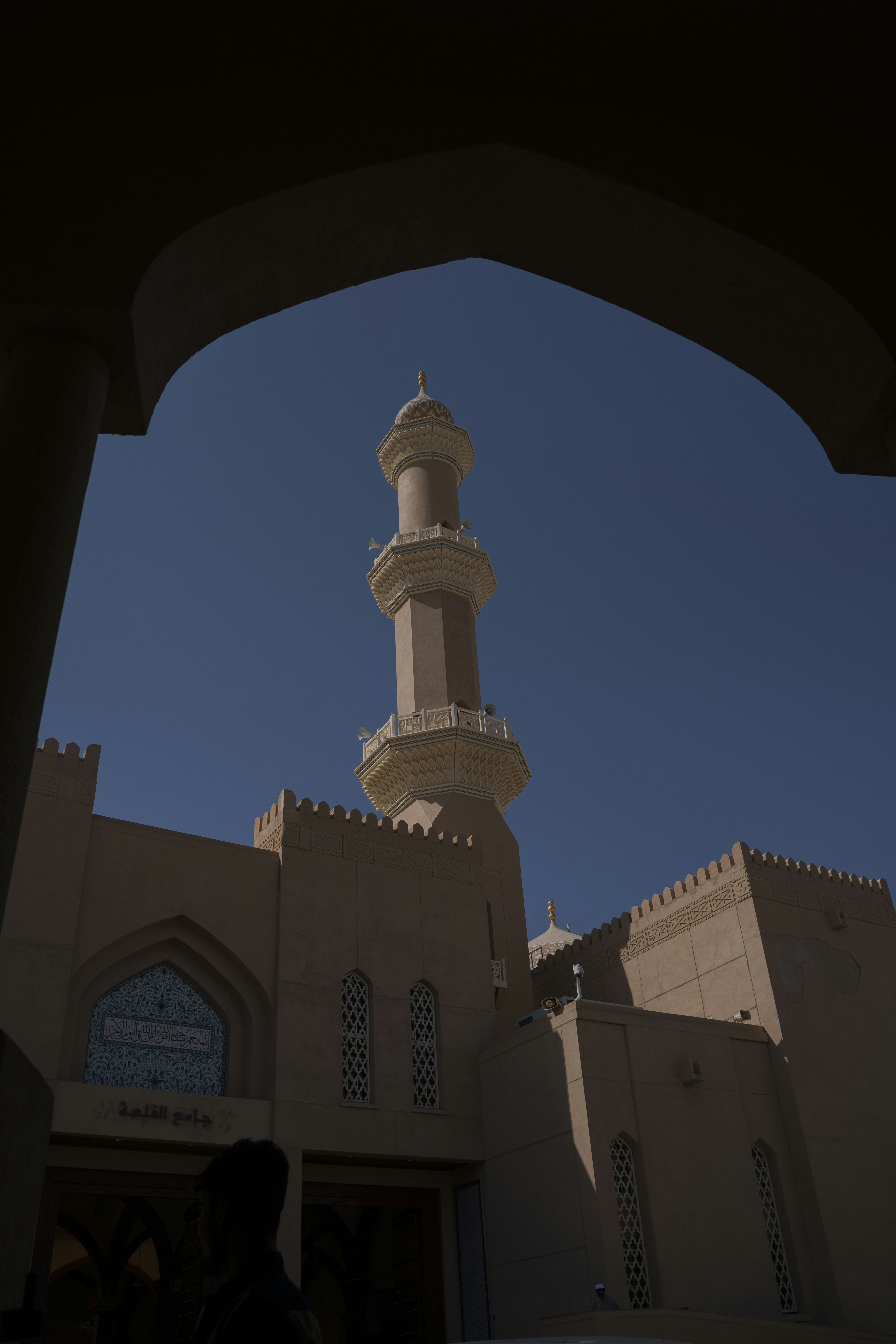 A tall white building with a clock on it's side photo – Free Oman Image ...