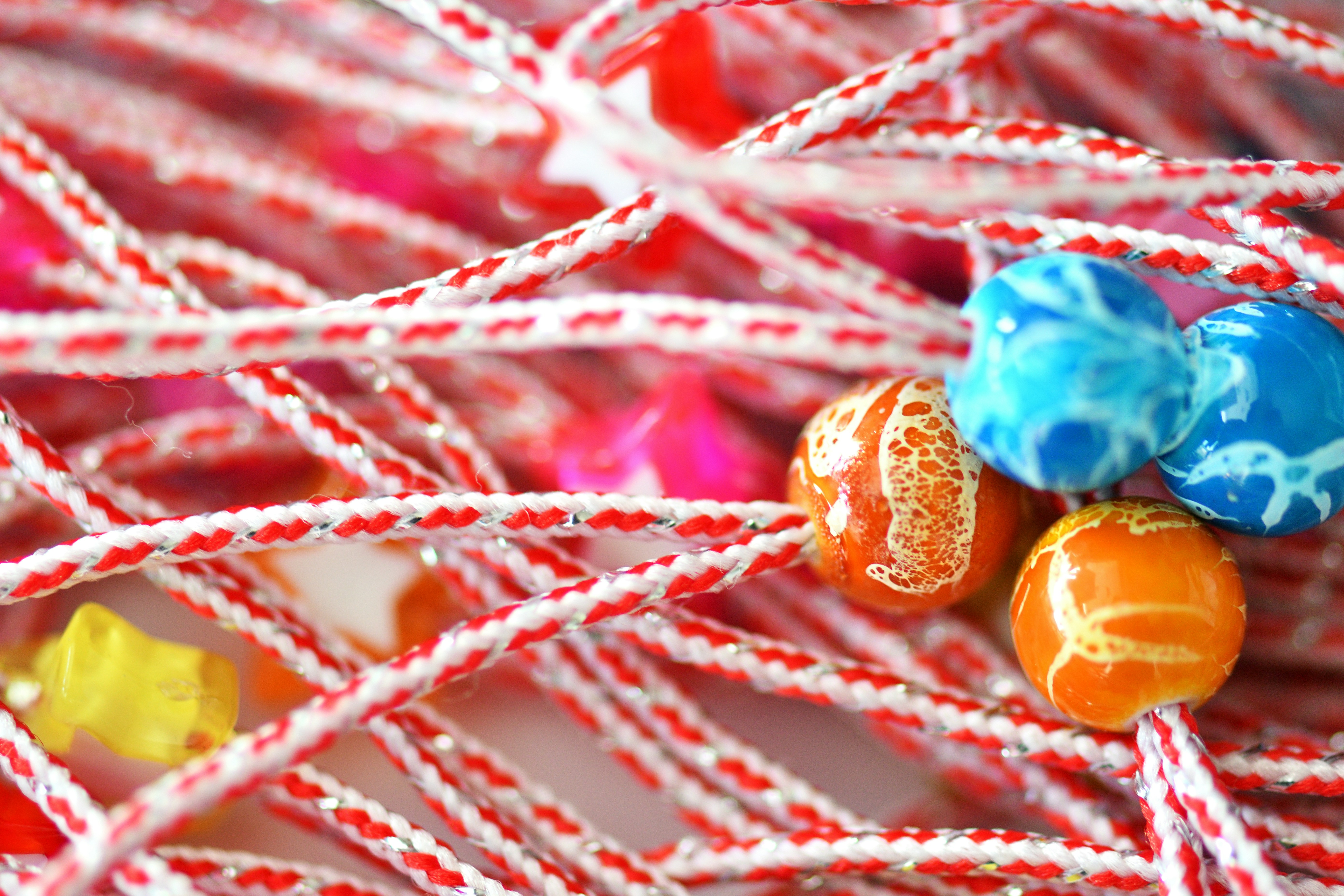 A close up of a bunch of candy on a string photo – Free Accessory Image ...