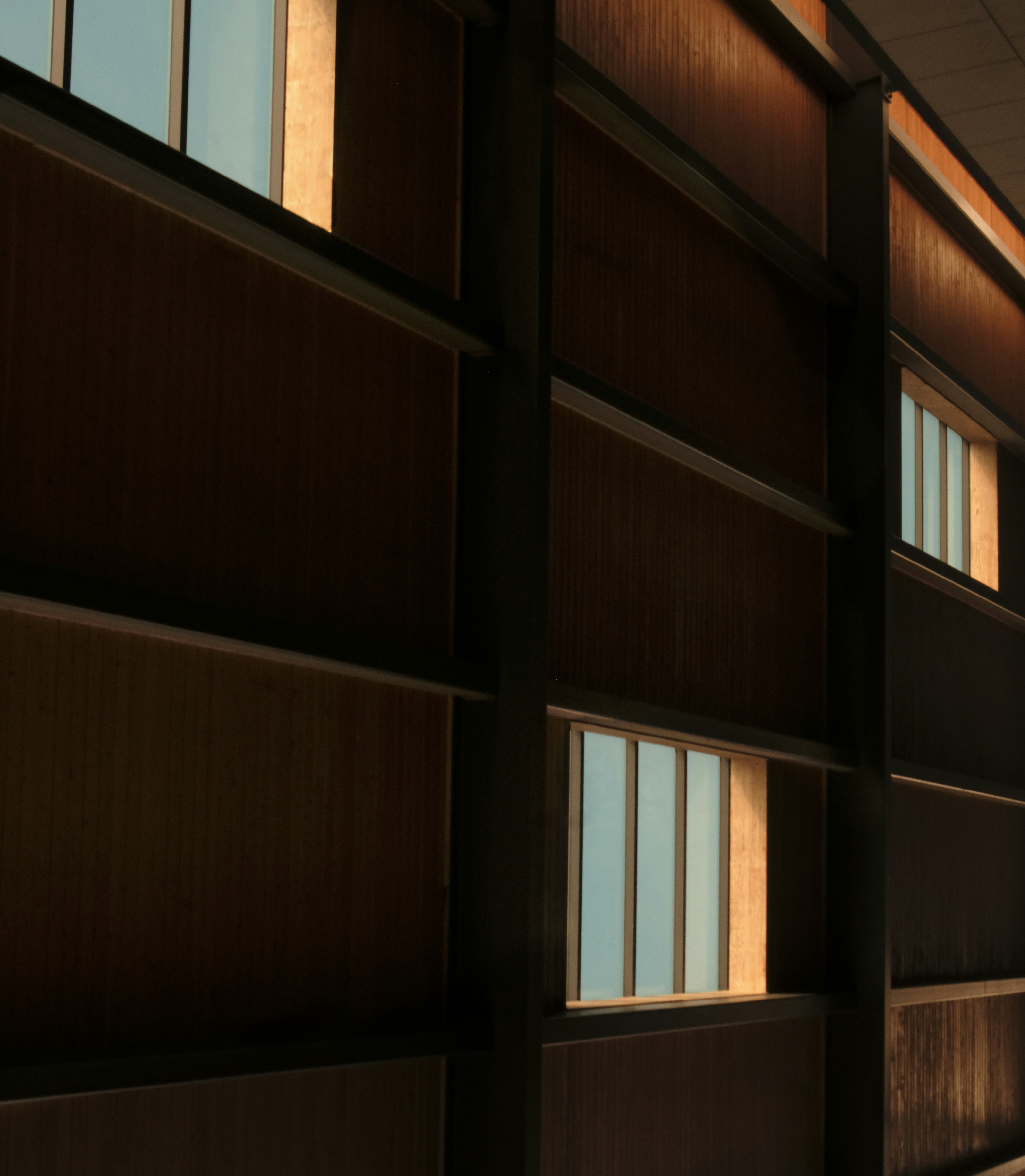 A room with a bunch of windows in it photo – Free Black Image on Unsplash