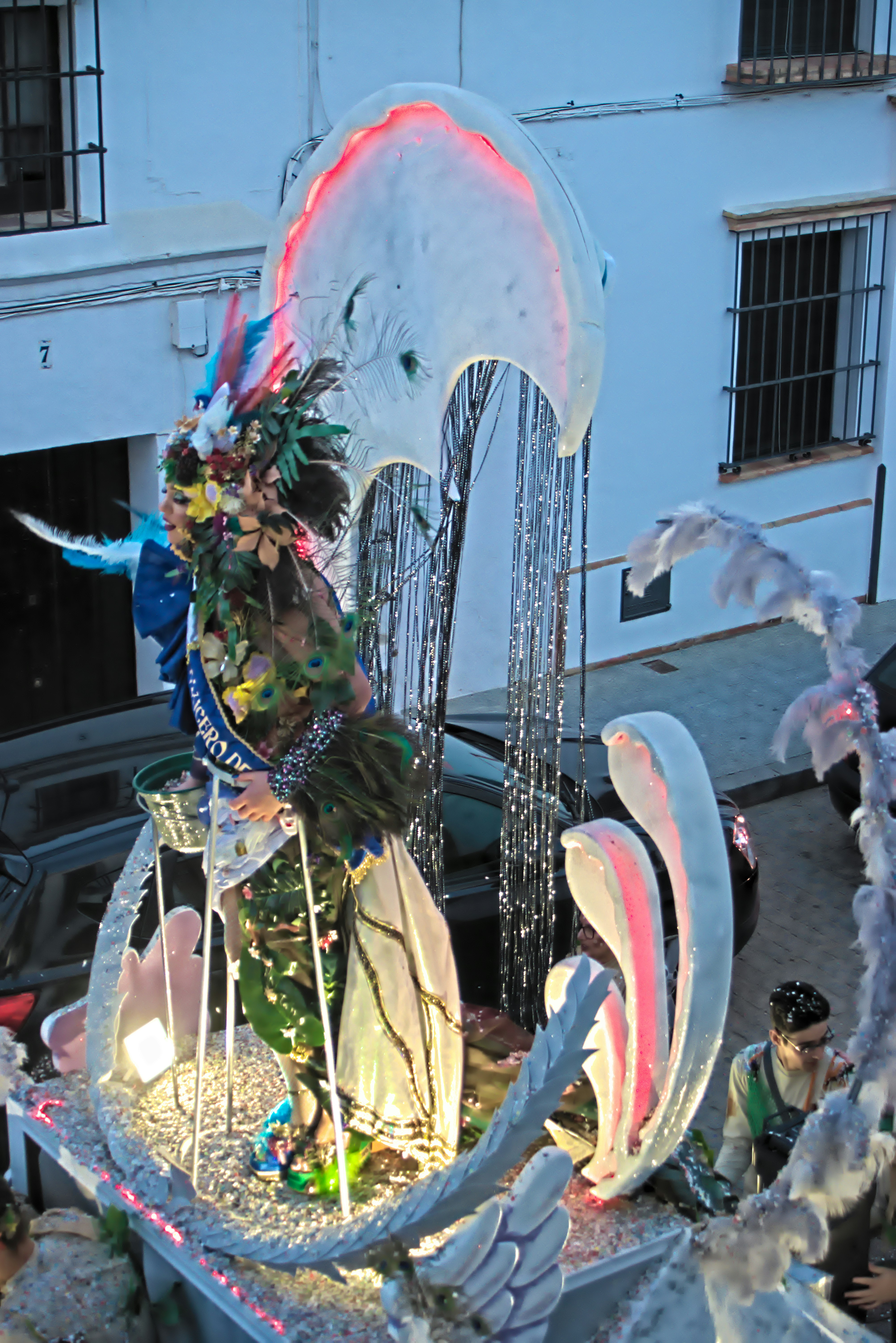 Iridescent Wings Over a Floral Parade Float