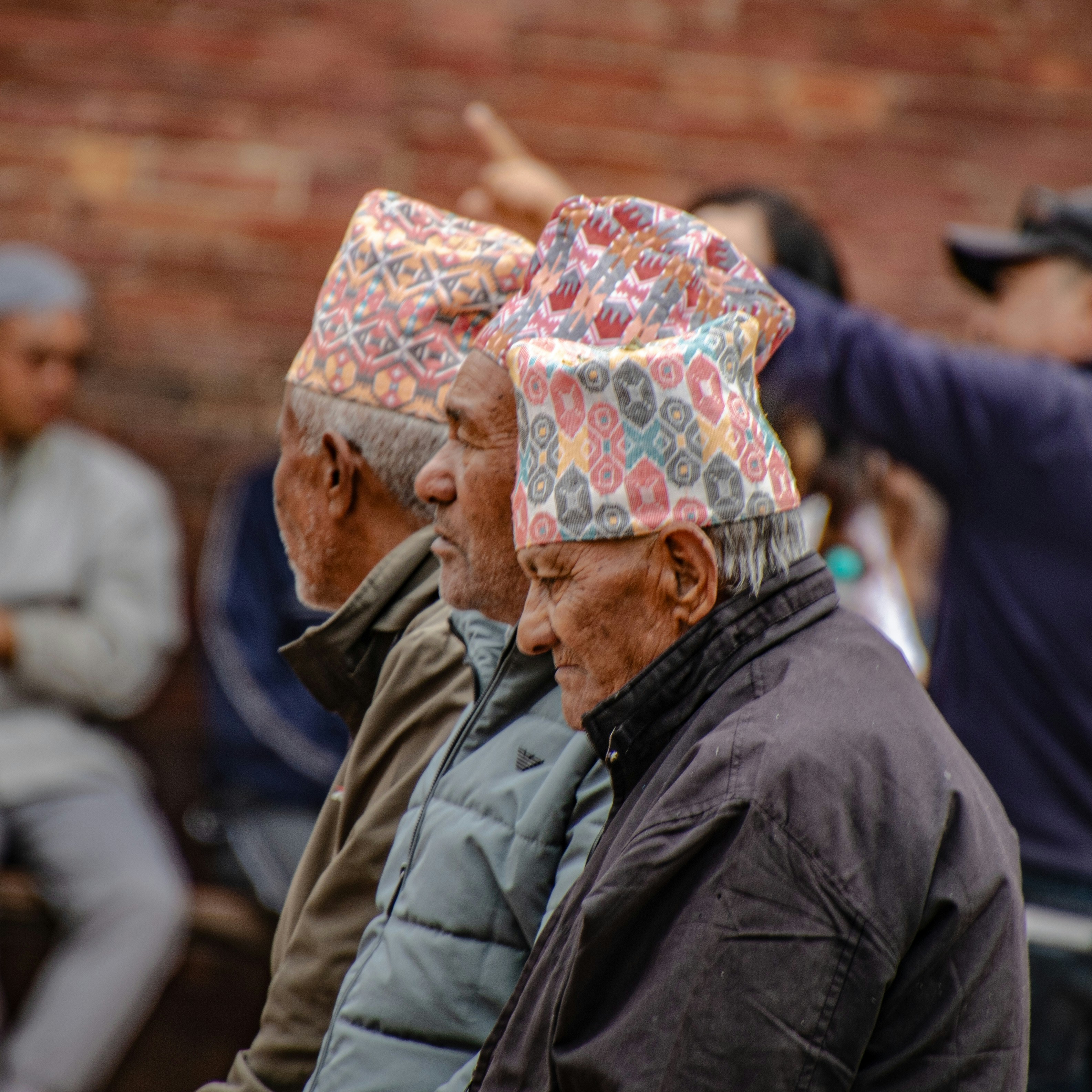 3 Nepali men sitting