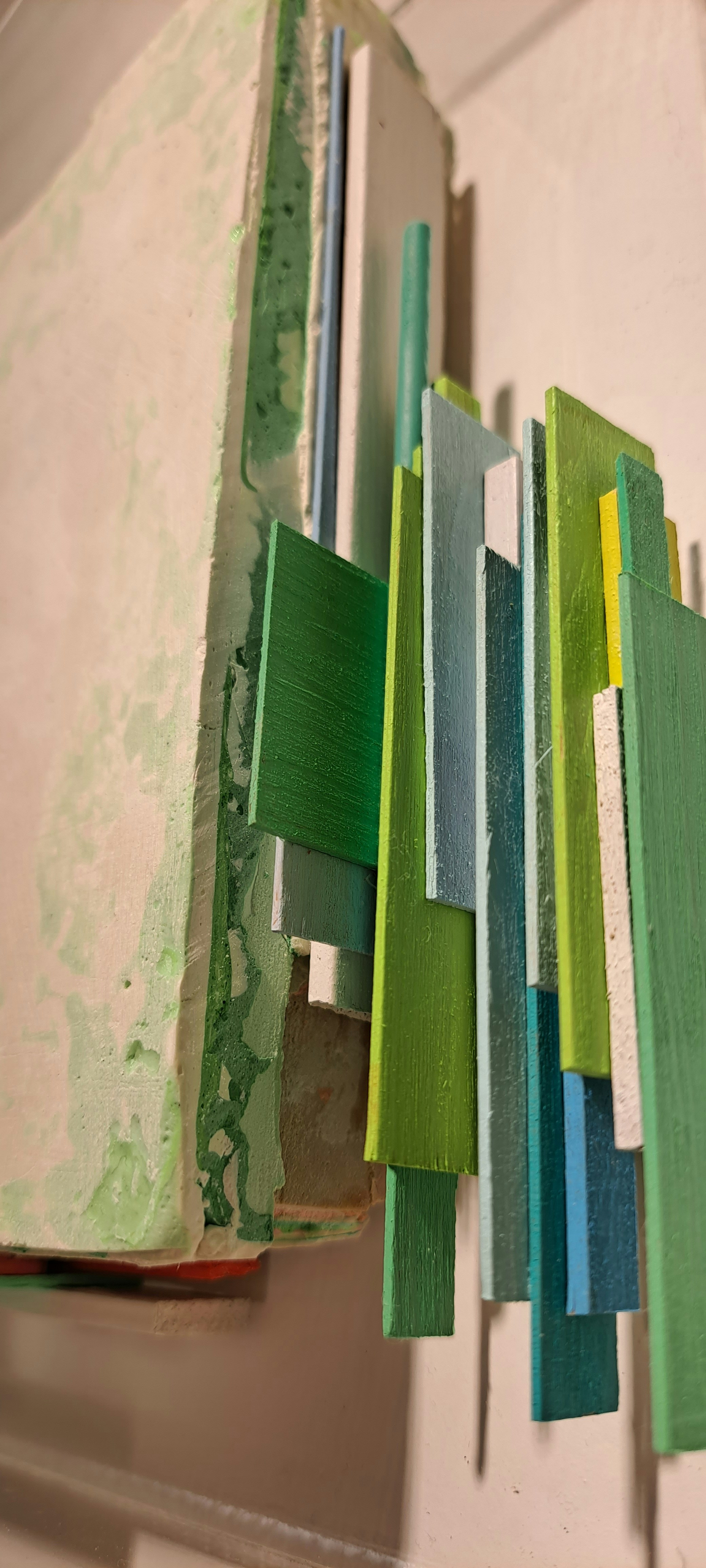 Vertical Mosaic of Painted Strips in Green and Teal