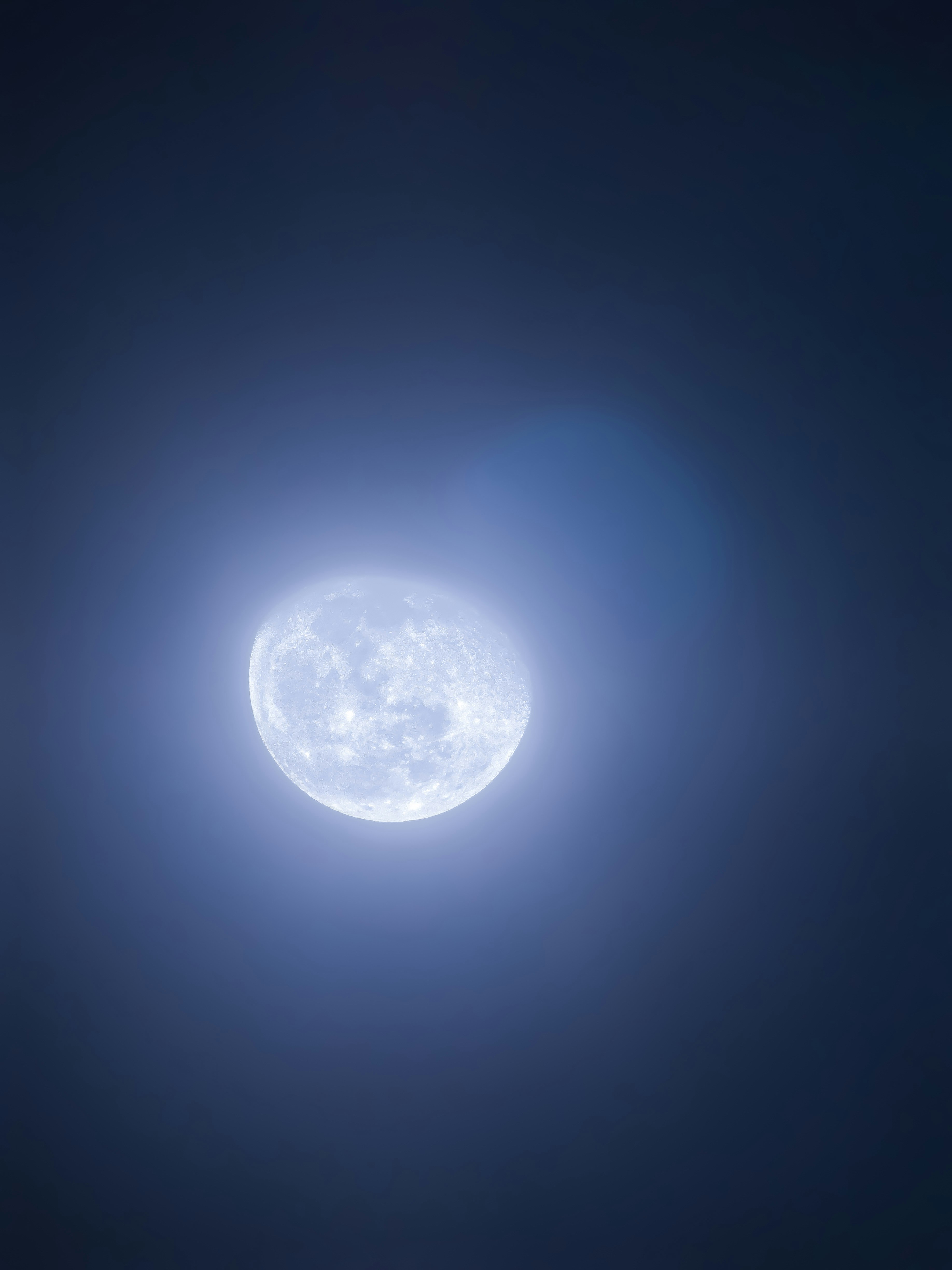A bright blue moon in the dark sky photo – Free Blue Image on Unsplash