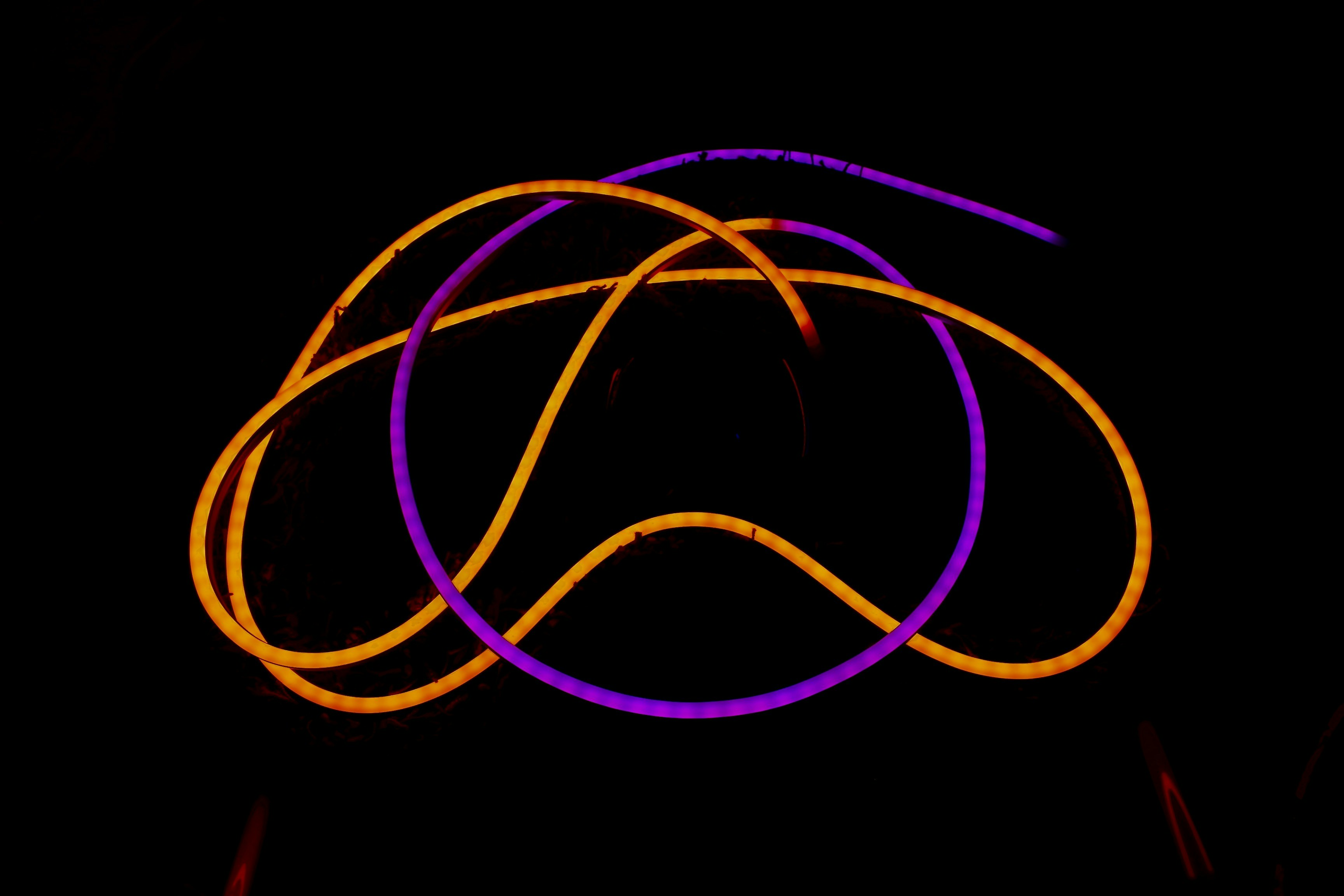 A close up of a neon colored object in the dark photo – Free Logo ...