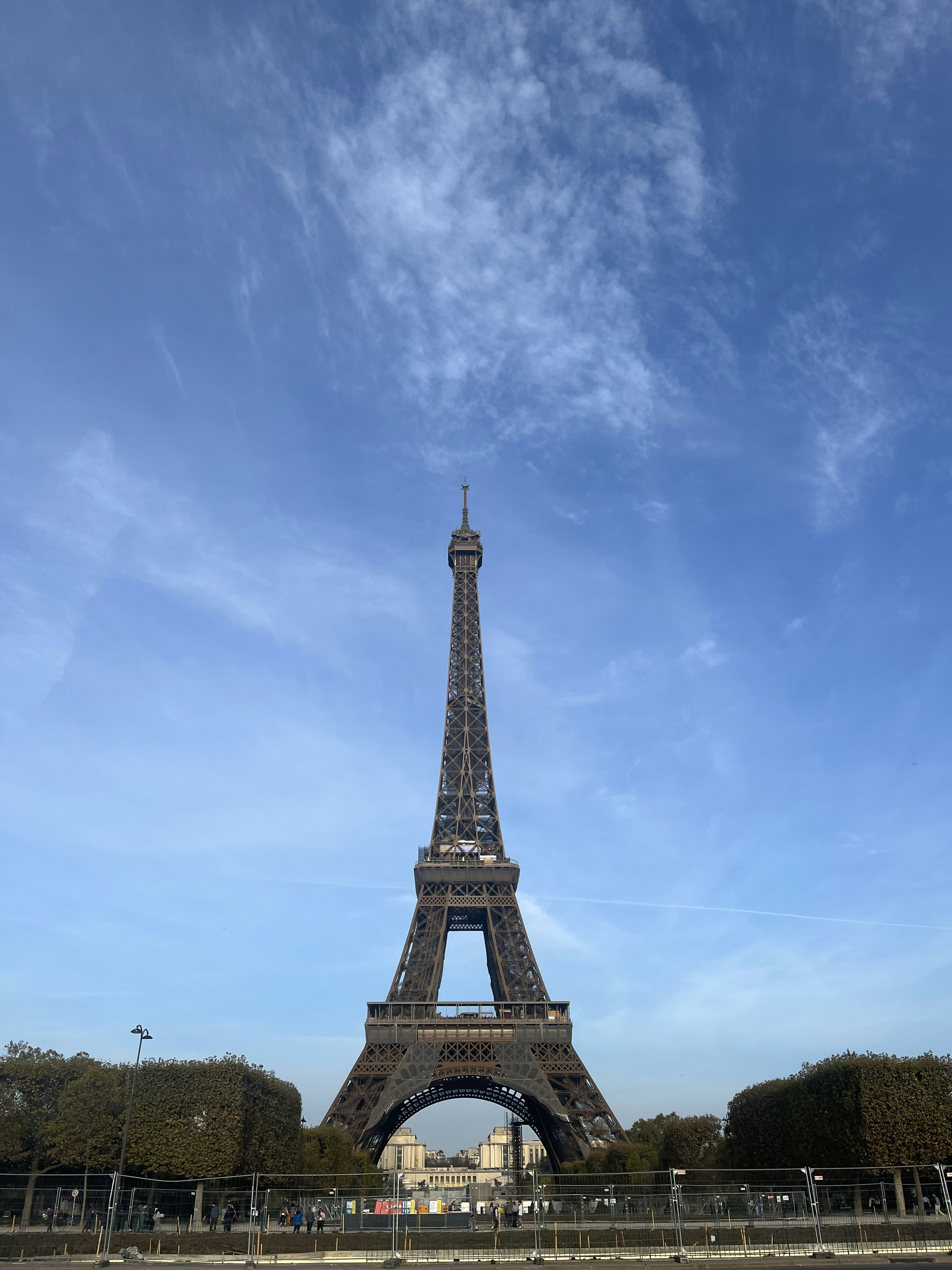 Eiffel Tower's Iron Lace Rises Under a Pristine Parisian Sky