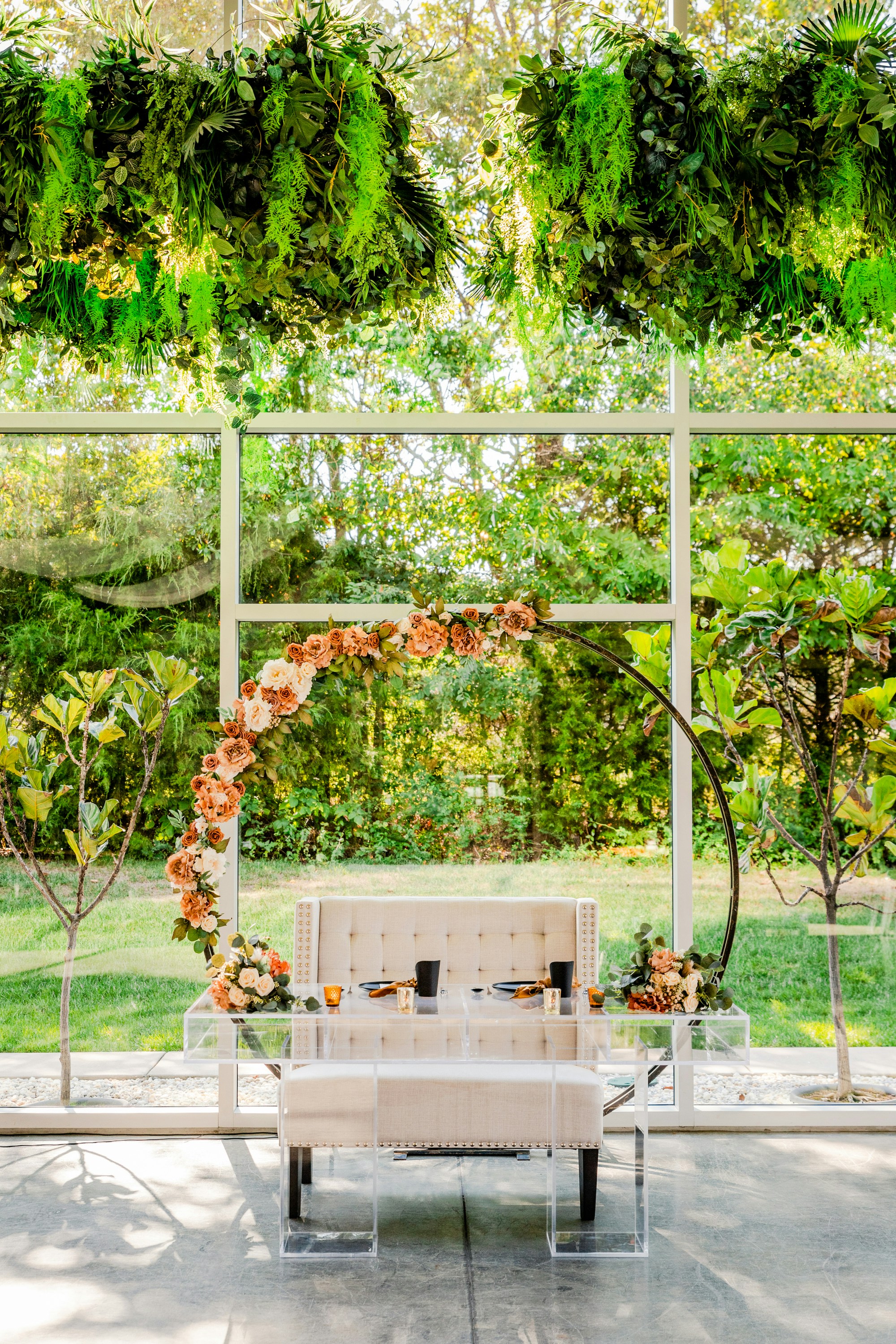 Peach Rose Arch Framing a Crystal Table in a Sunlit Conservatory