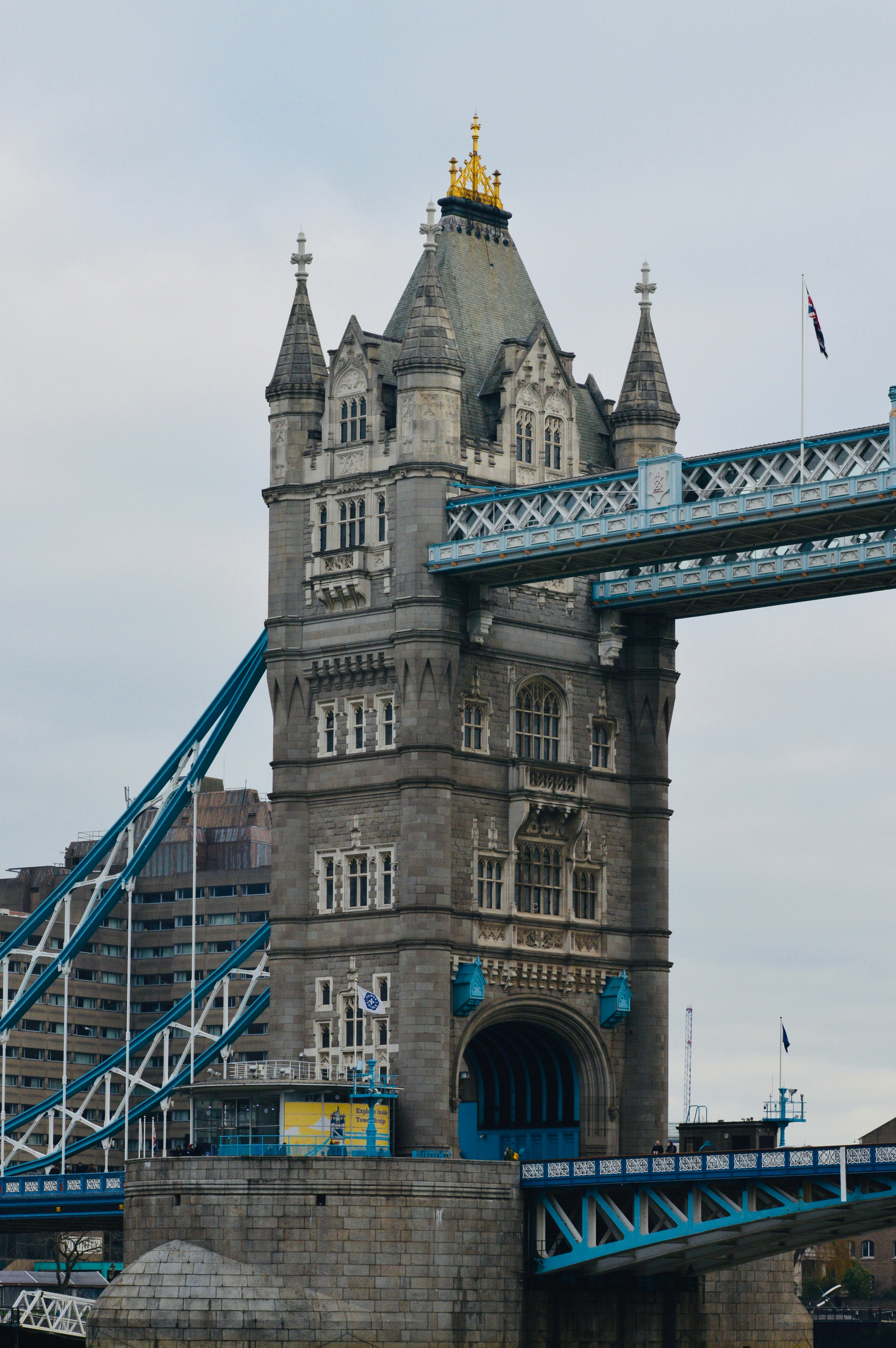 A tall tower with a clock on it's side photo – Free Tower bridge Image ...