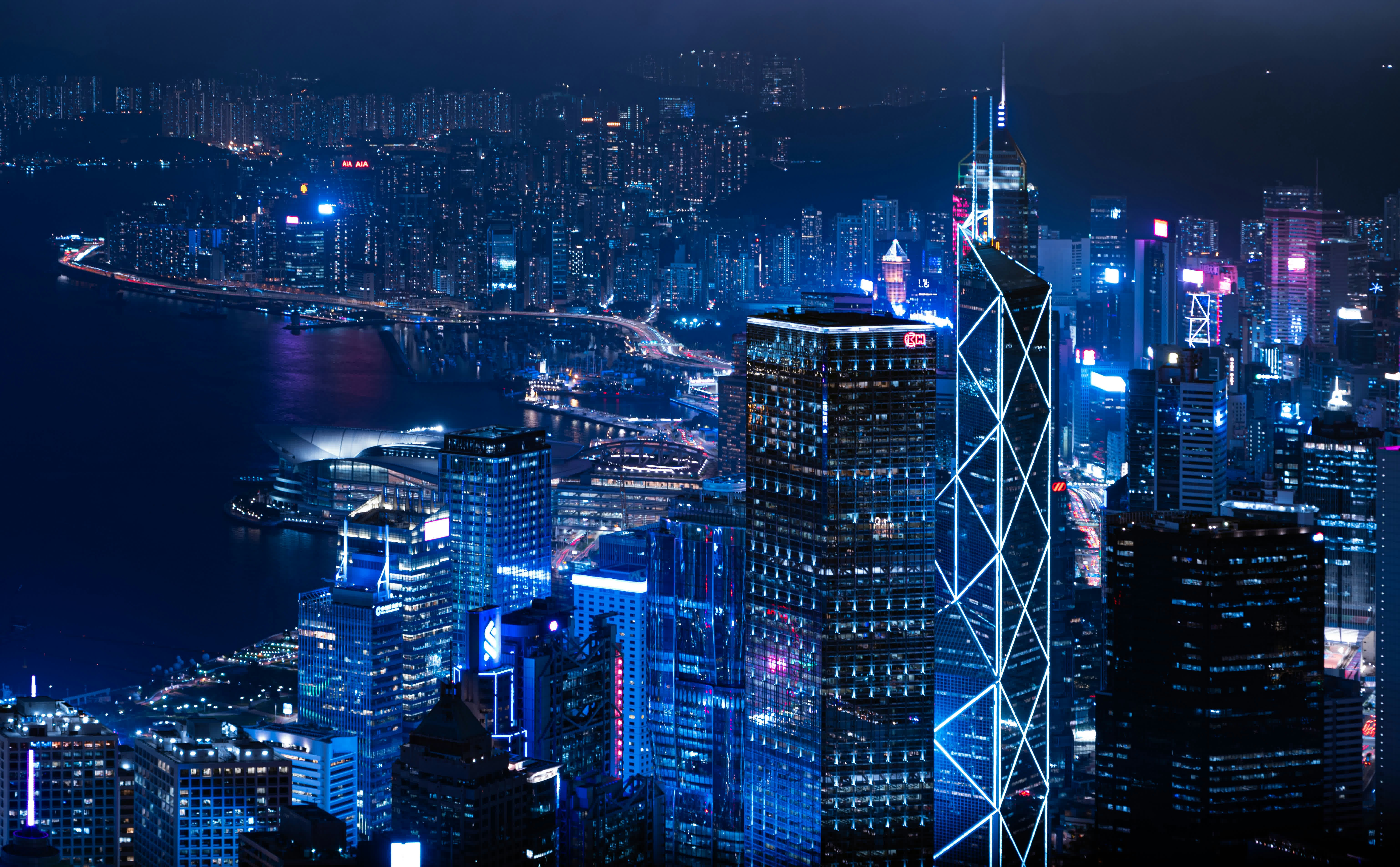 A large city at night with a lot of lights photo – Free Night city ...