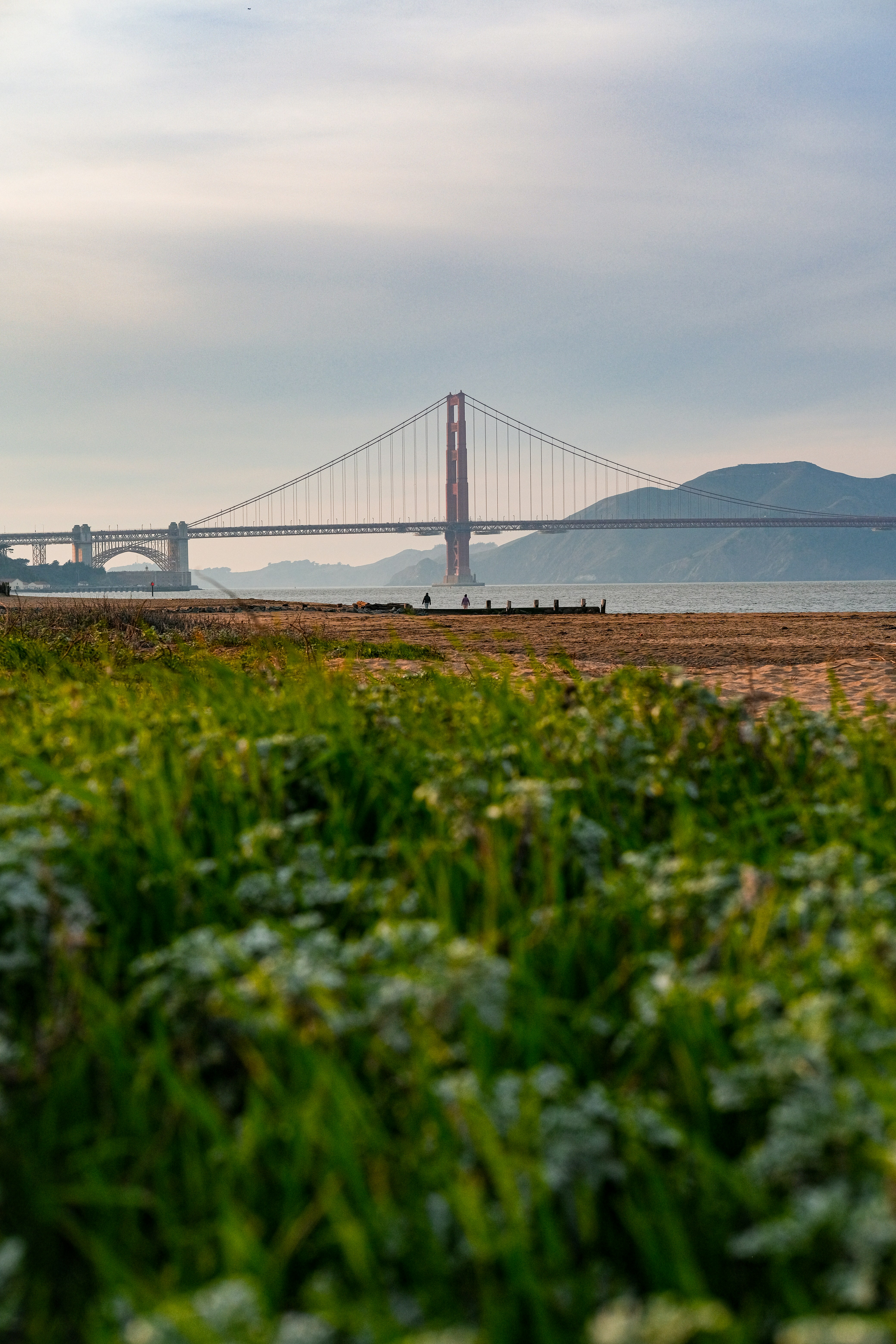 Golden Gate Silhouette at Dusk Over a Coastal Plain