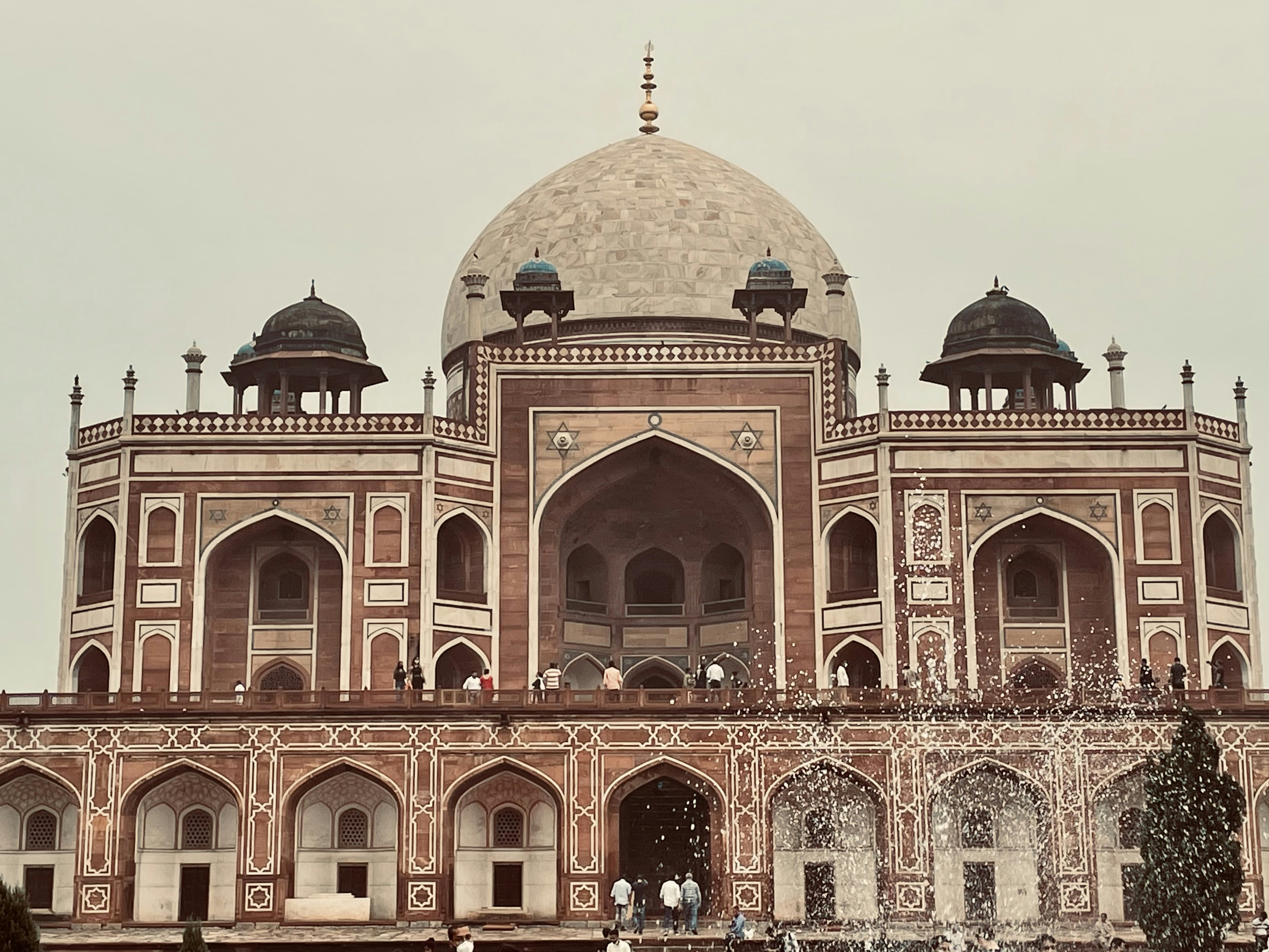 A large building with a dome and a fountain in front of it photo – Free ...