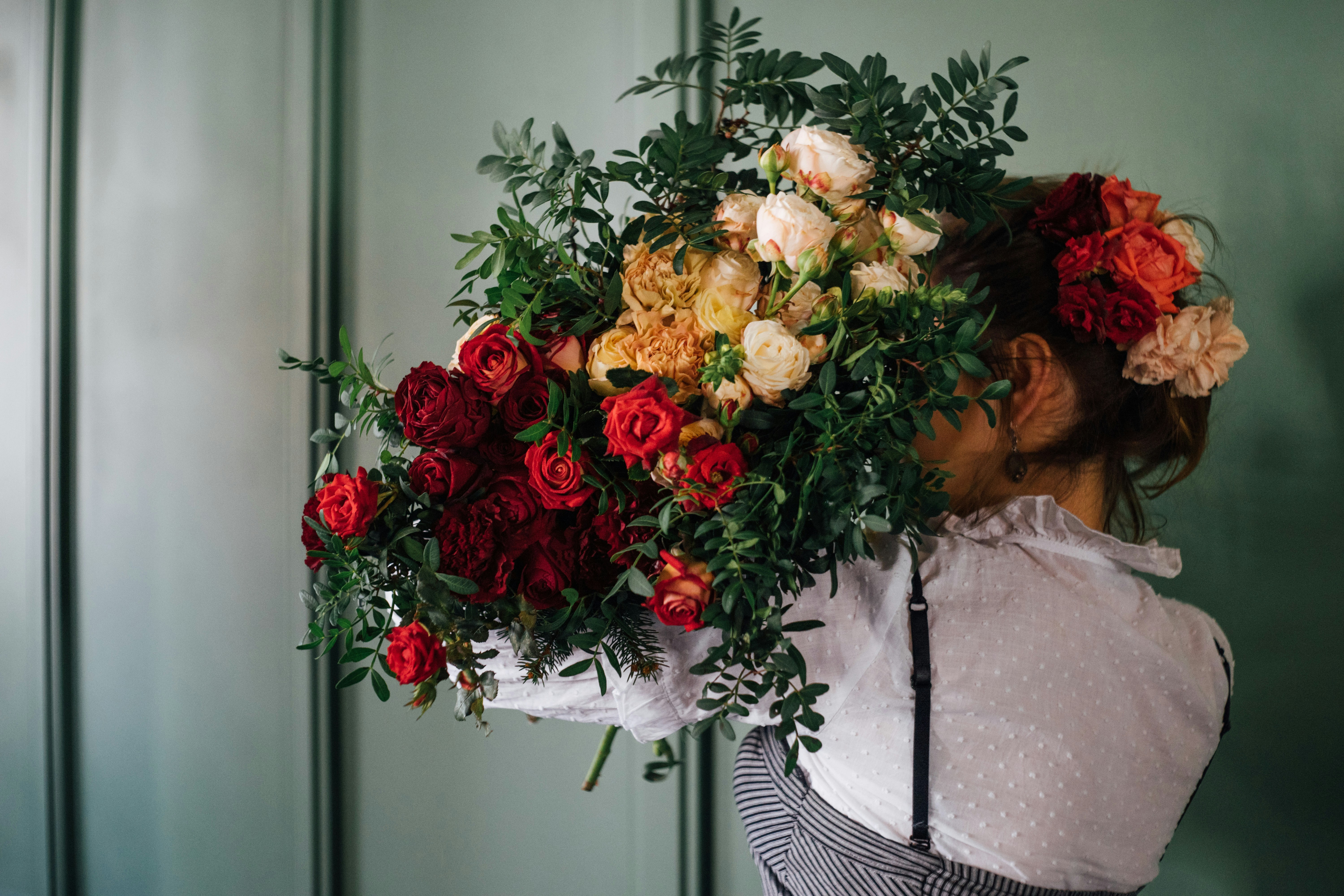 Bouquet Crown: A Floral Portrait Against a Glassy Backdrop