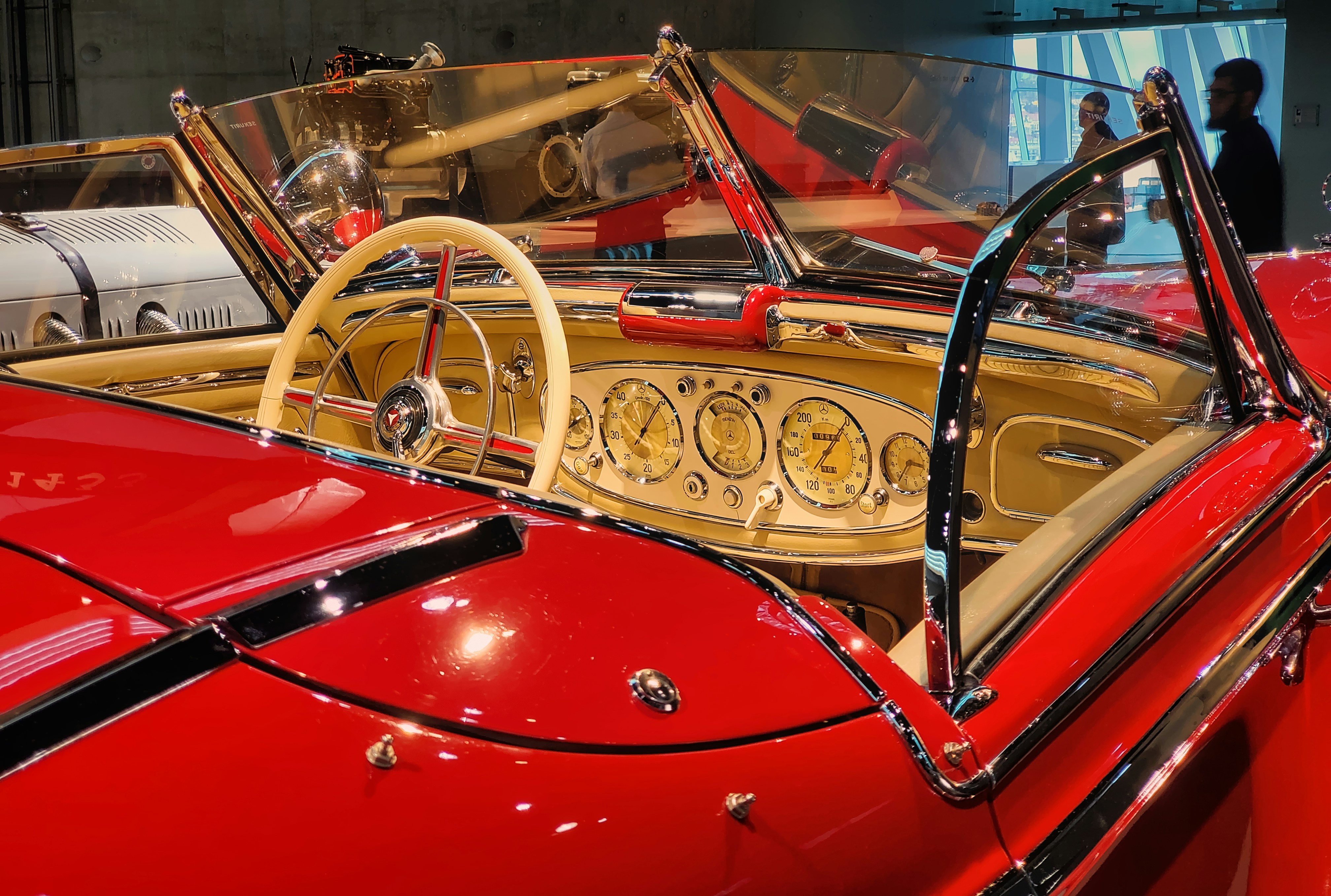 A red car with a yellow steering wheel photo – Free Stuttgart Image on ...