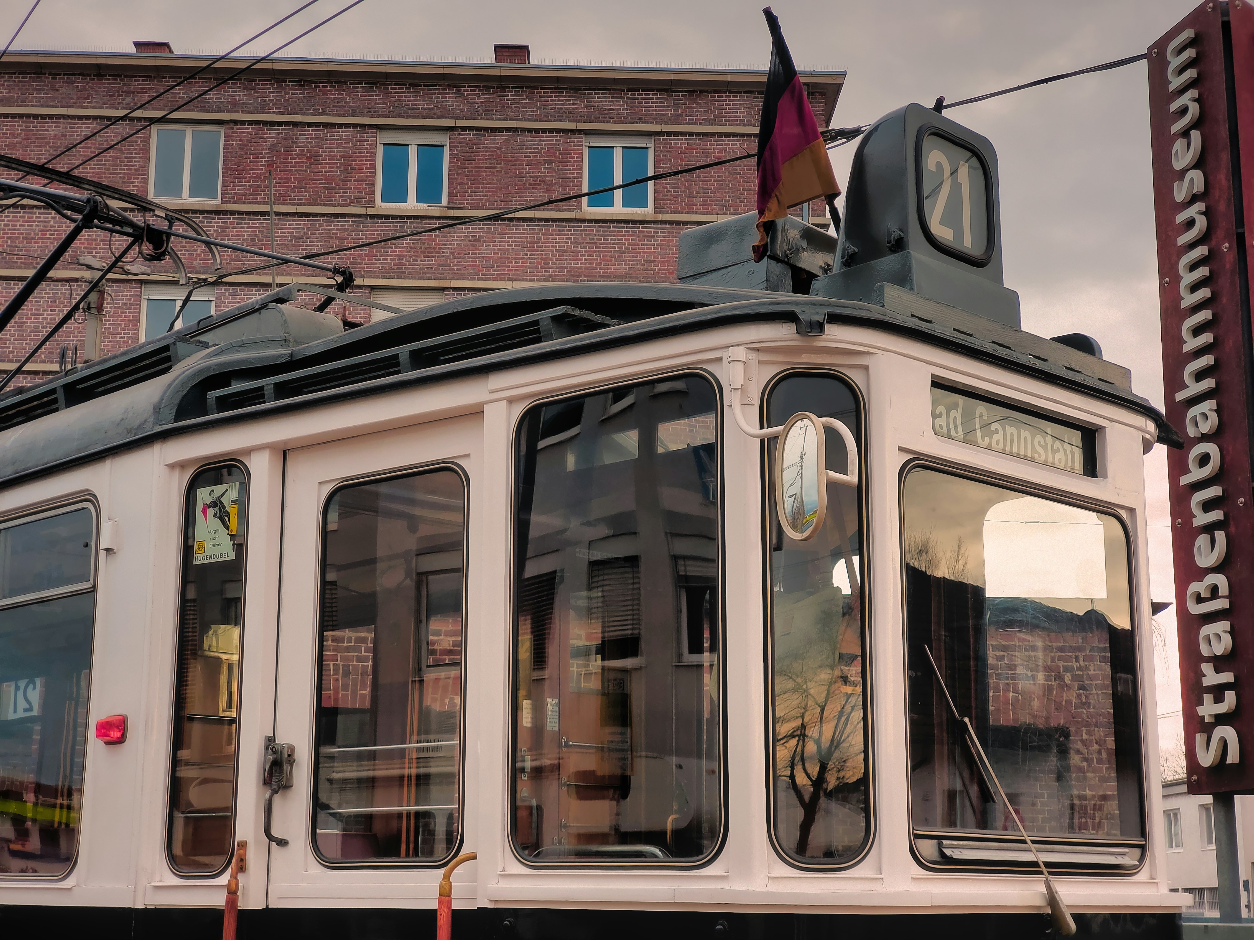 A white trolley car on a city street photo – Free Germany Image on Unsplash