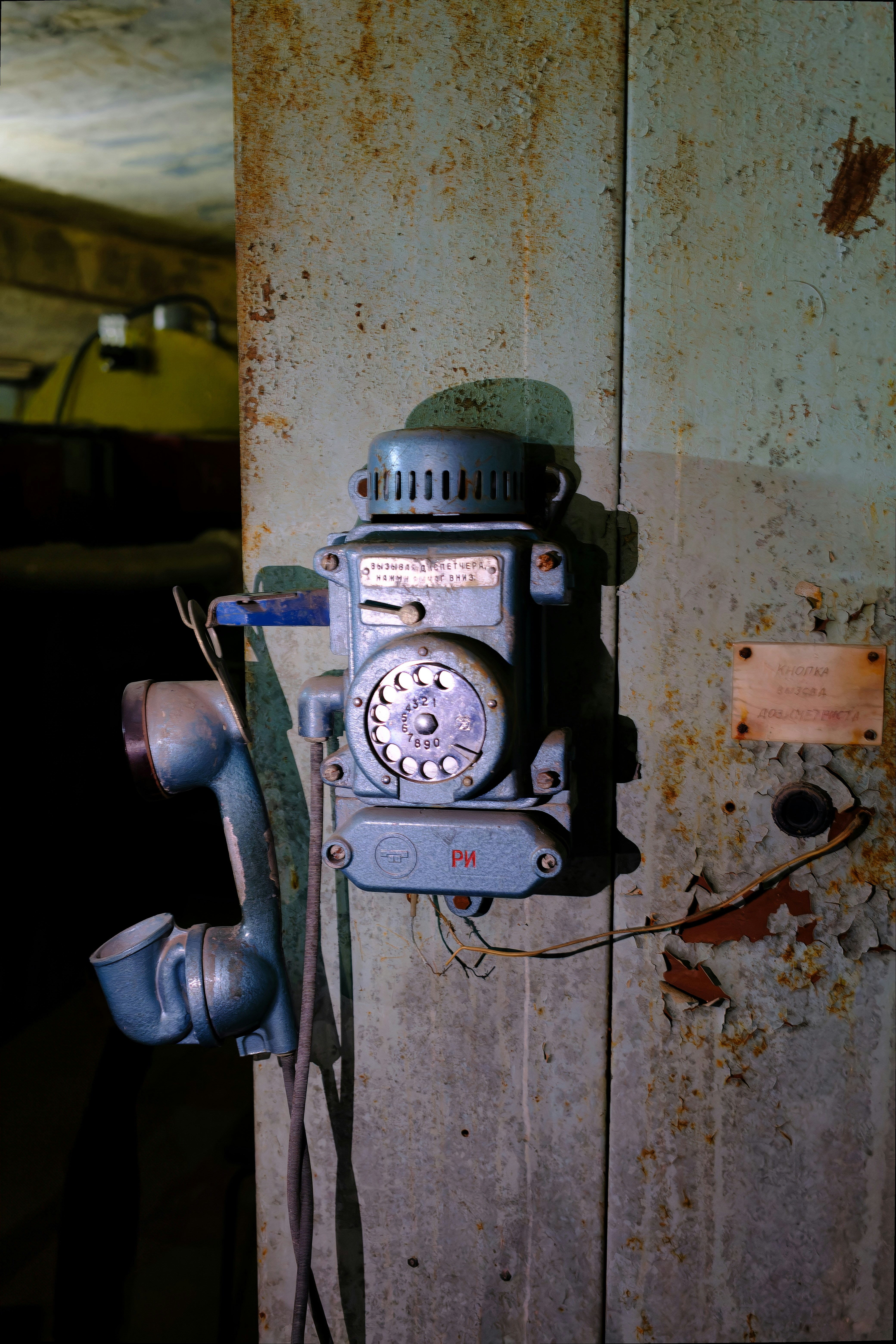 An old phone is attached to a rusty wall photo – Free Phone Image on ...
