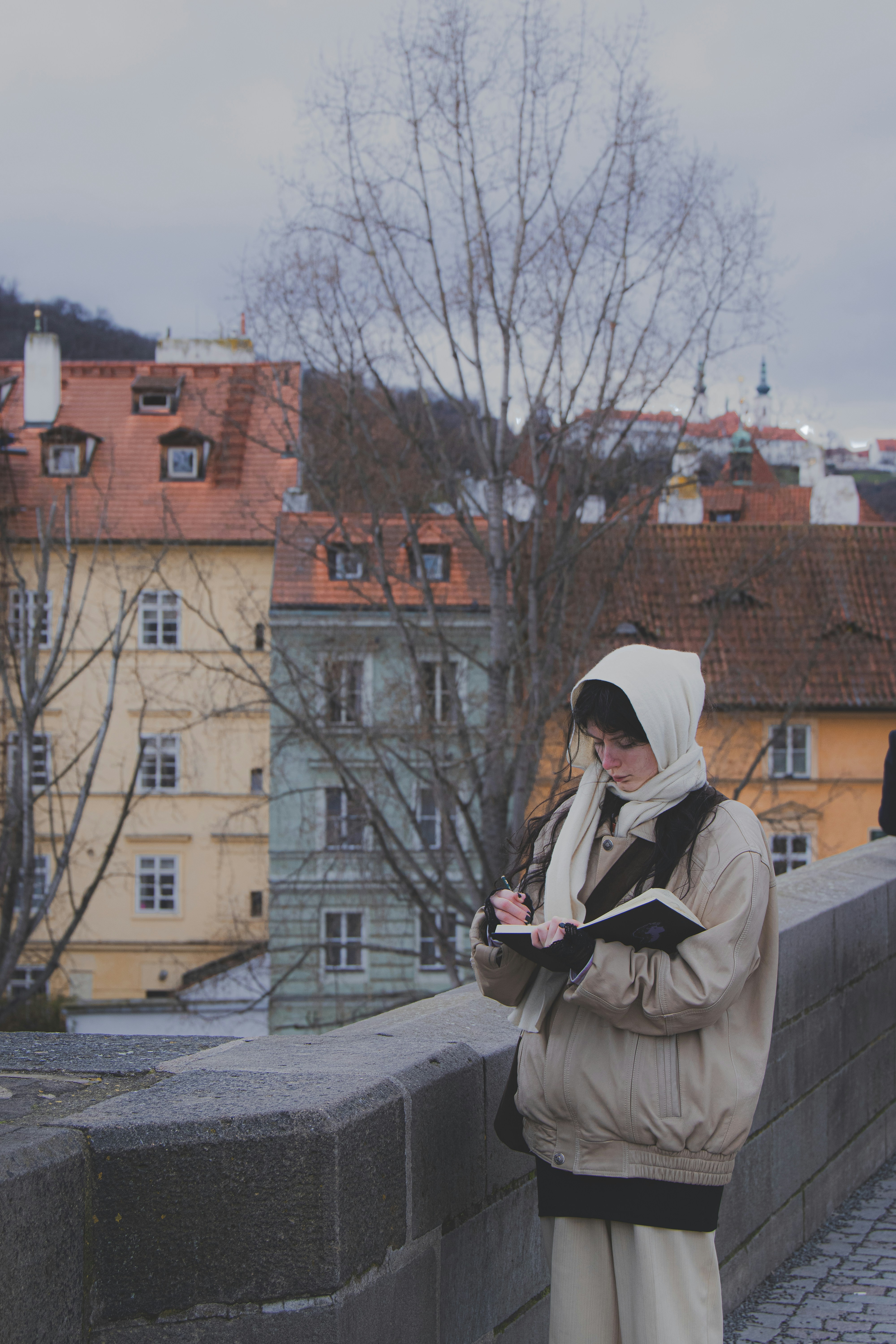 Sketching in Soft City Light Among Pastel European Façades